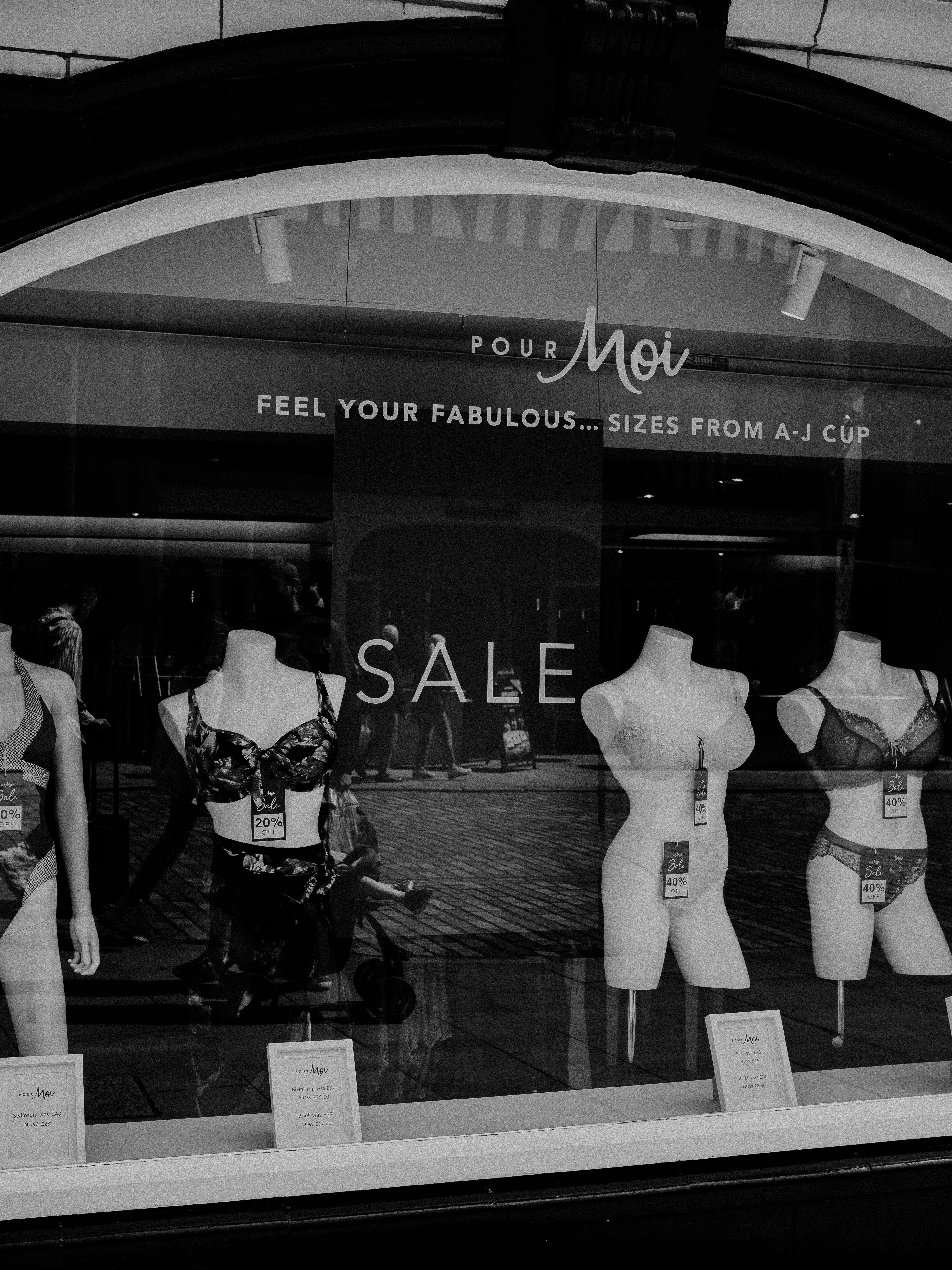 Lingerie on Display in Store Window · Free Stock Photo