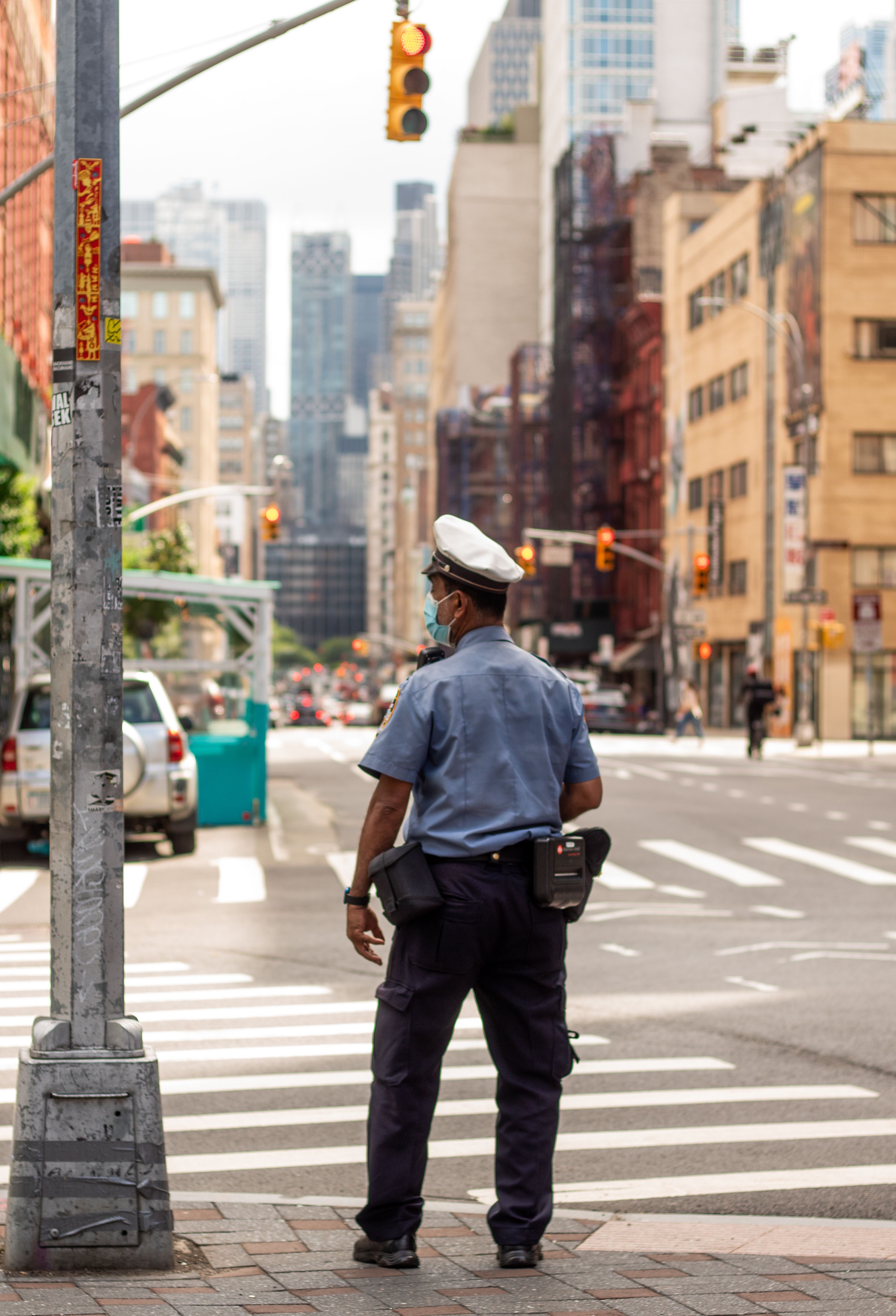 Group of Police Officers Walking Together down the Street · Free Stock ...