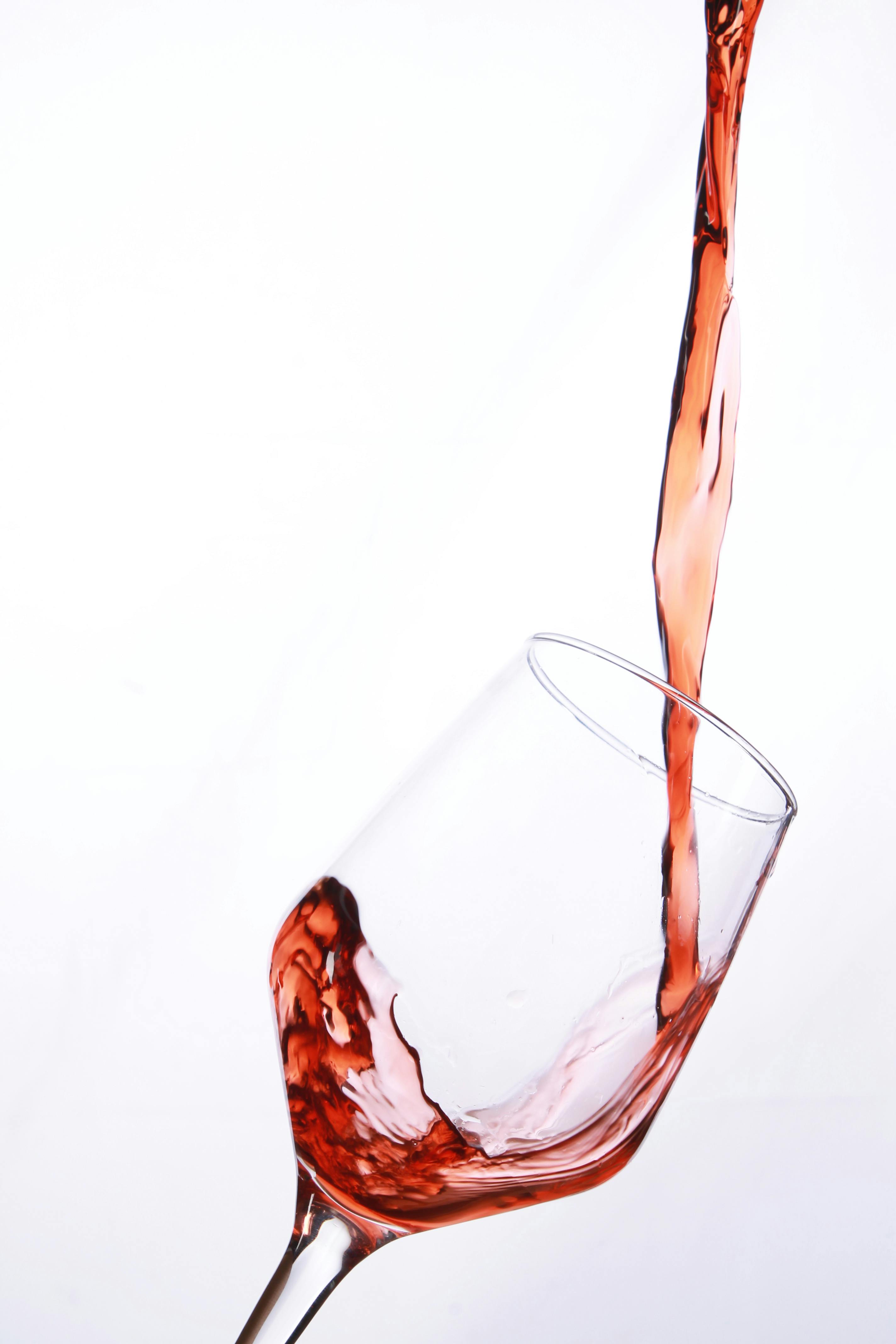 Pouring Red Wine on Glass · Free Stock Photo