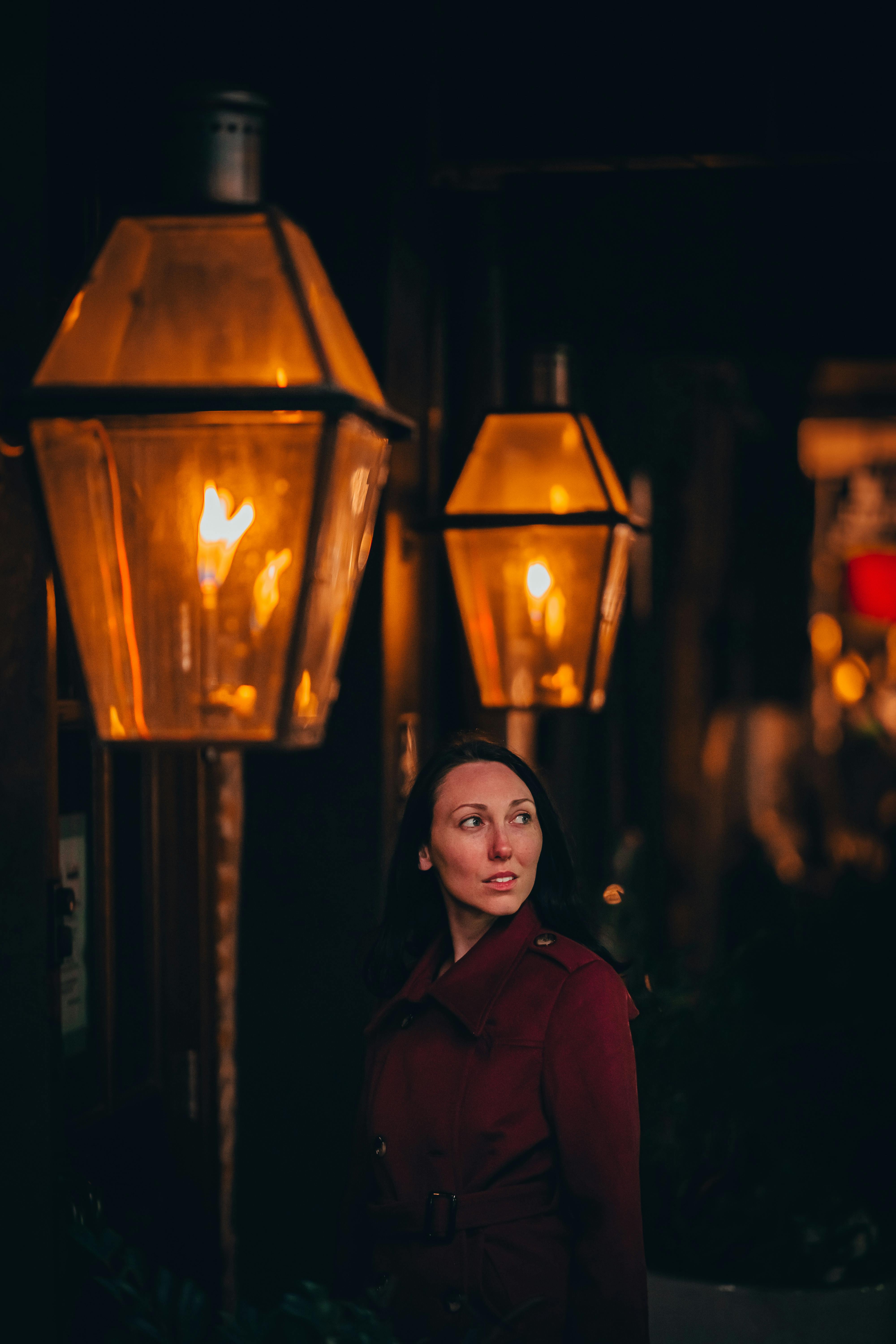Woman Standing by Lit Lanterns at Night · Free Stock Photo