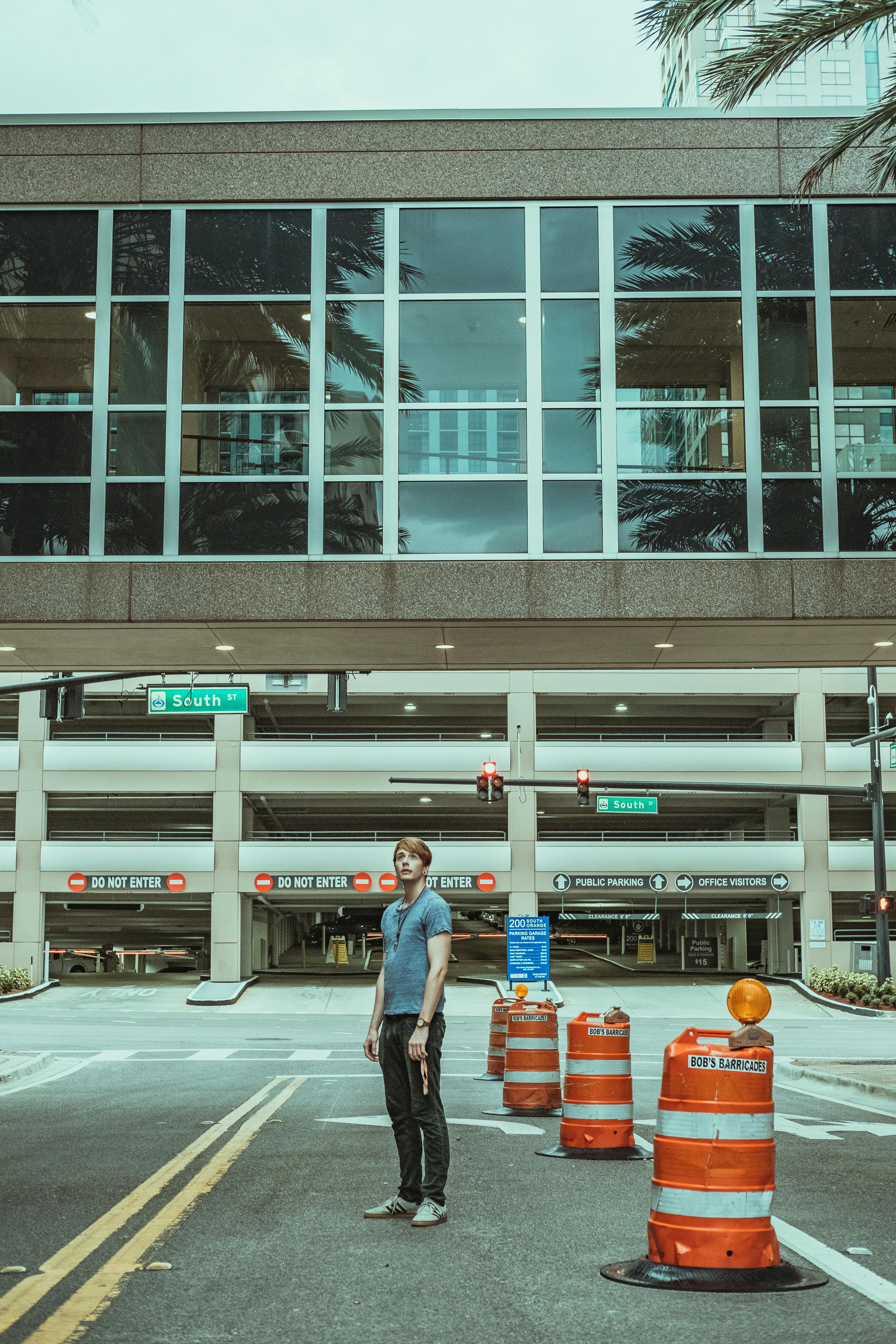 A Man Standing Near the Building · Free Stock Photo
