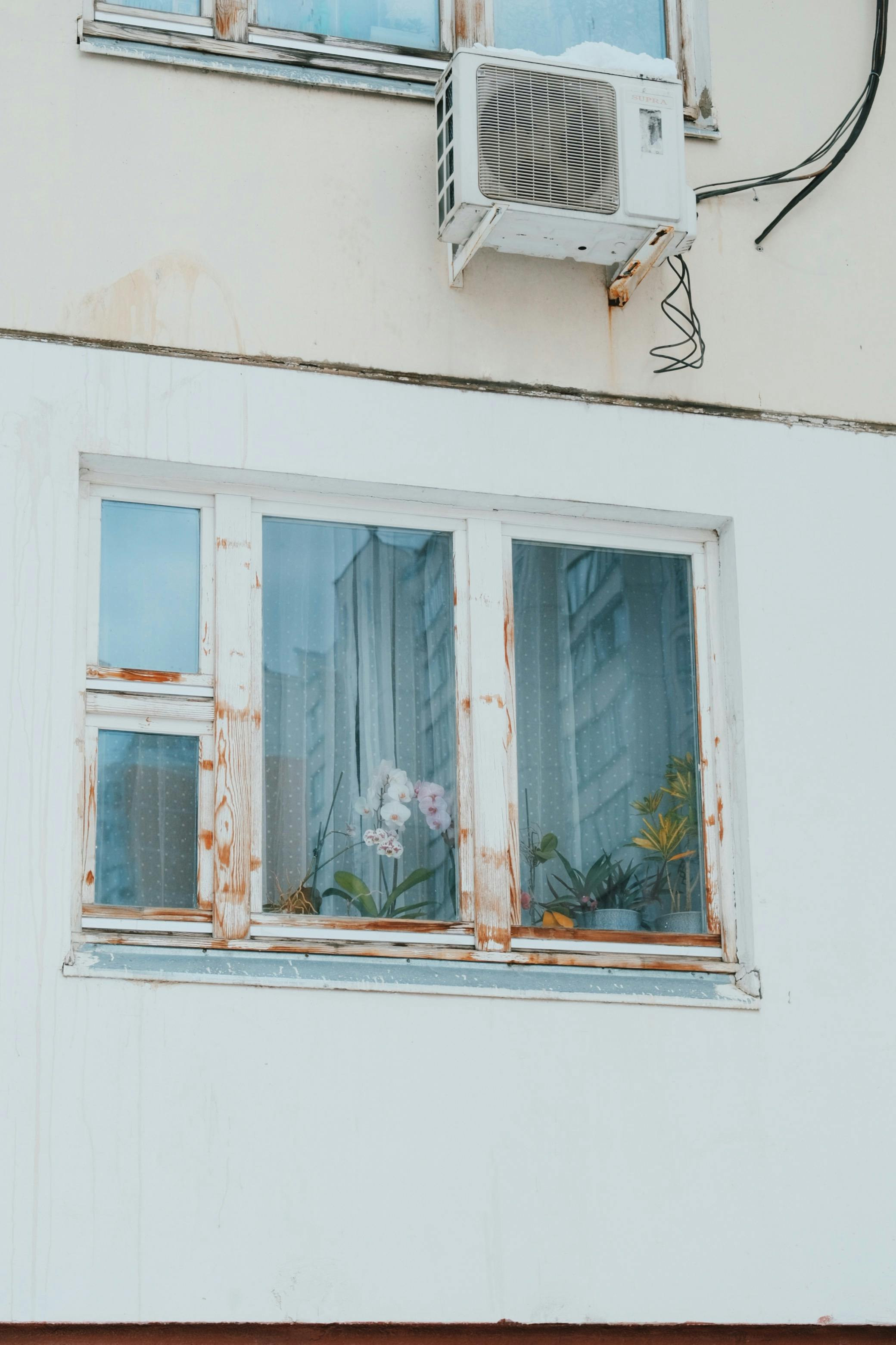 Air Conditioner over Windows · Free Stock Photo