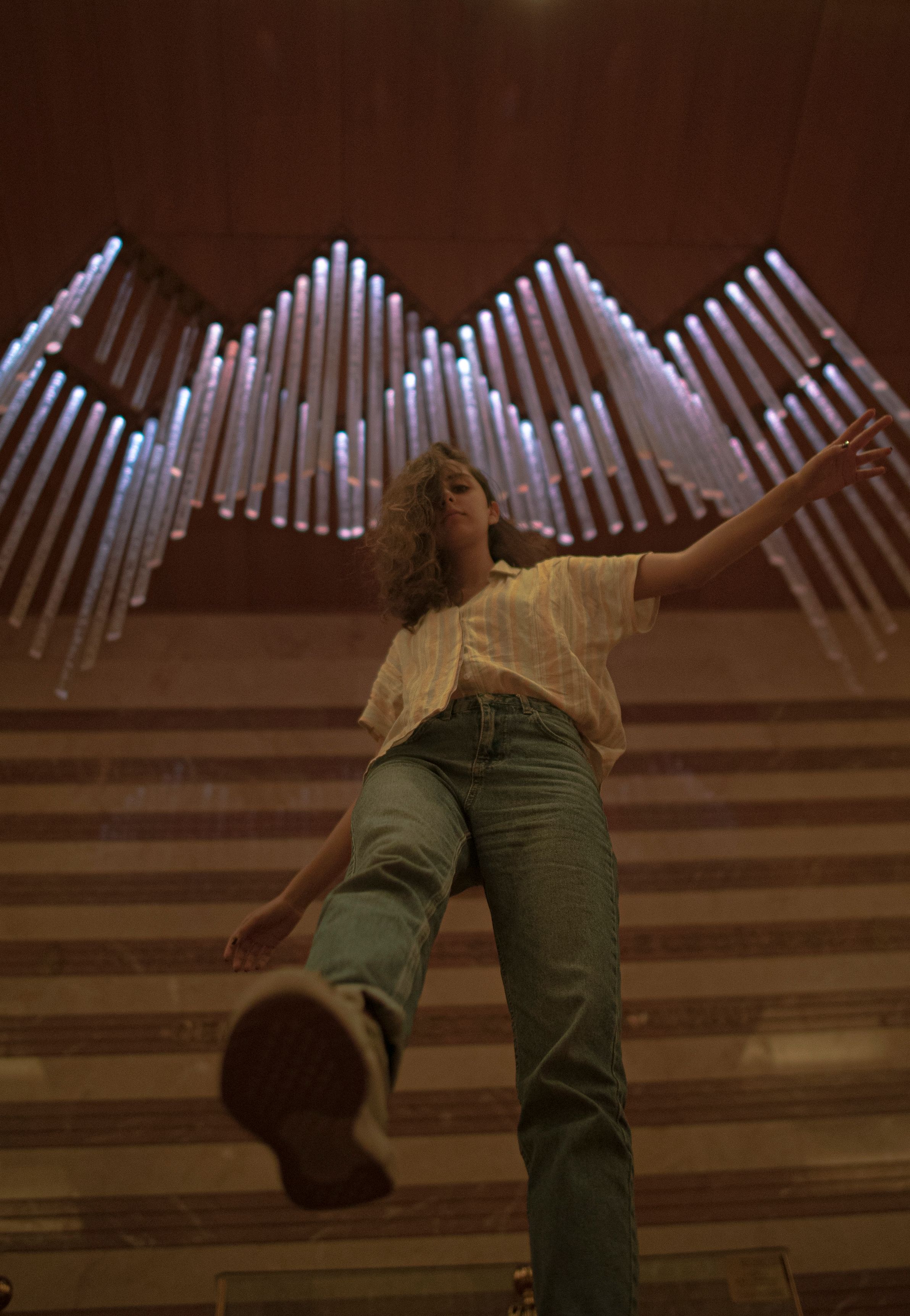 Low Angle Shot of Woman on Steps · Free Stock Photo