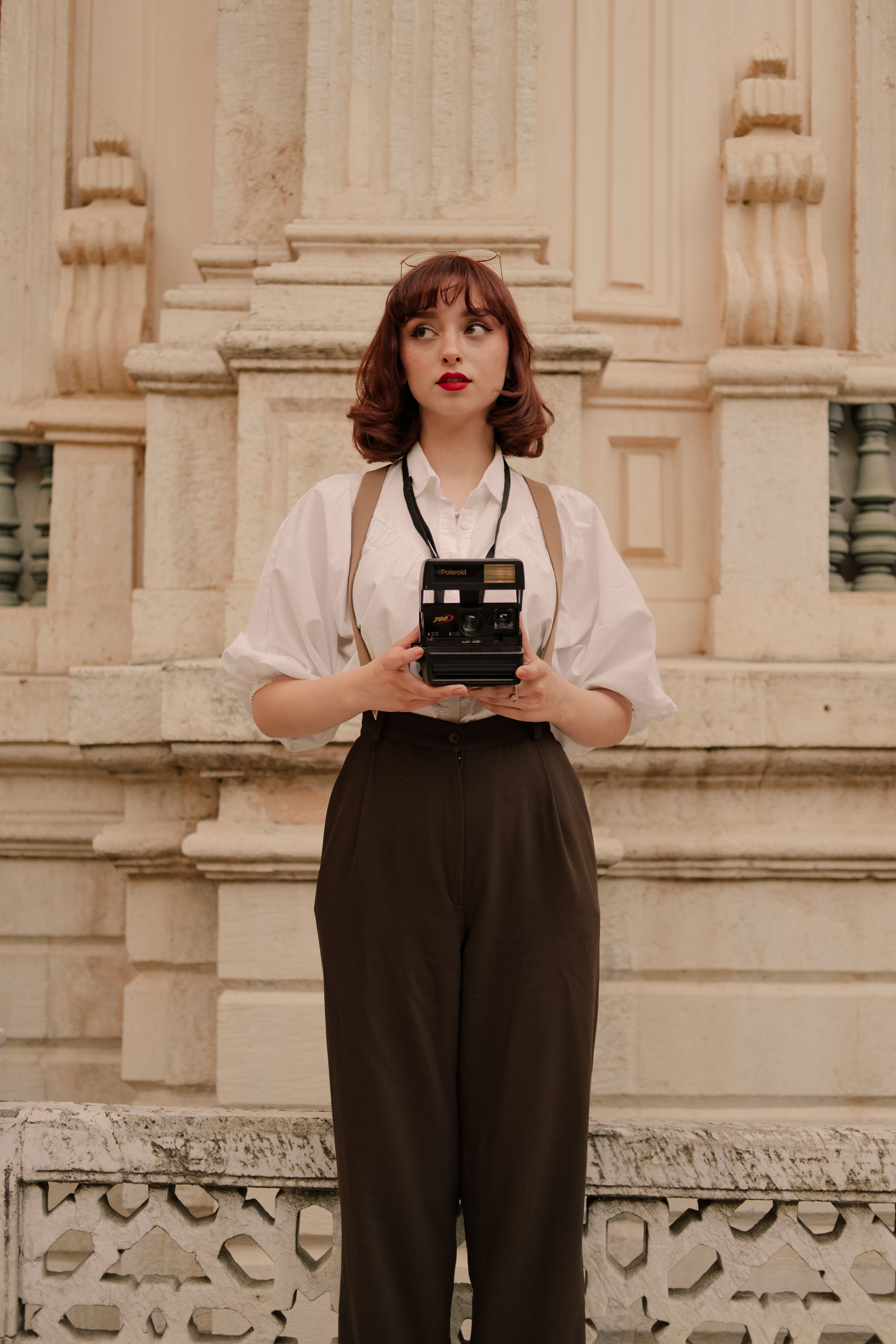 Portrait of Woman Holding Old Camera · Free Stock Photo