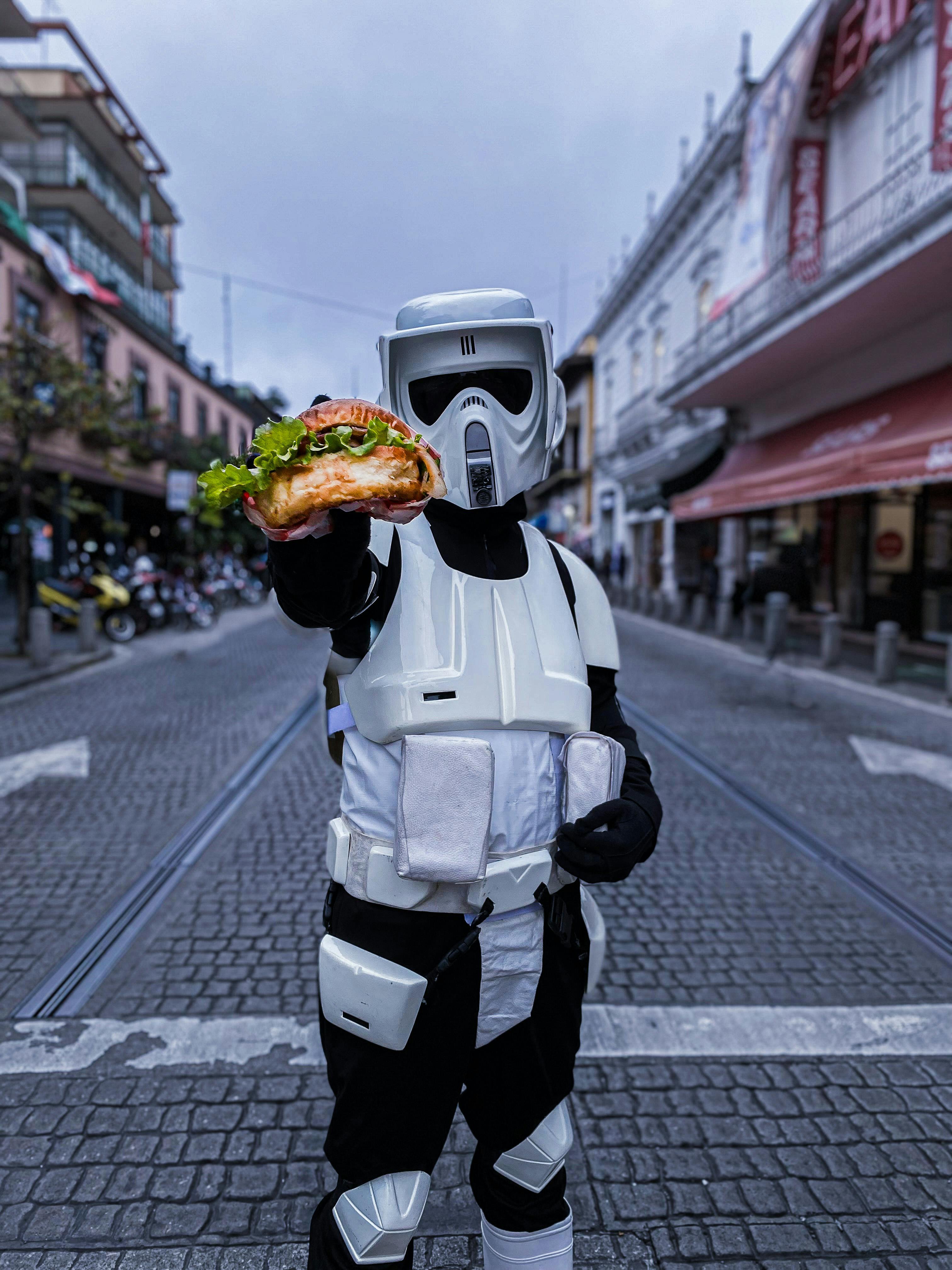 A Person Holding a Stormtrooper Costume · Free Stock Photo