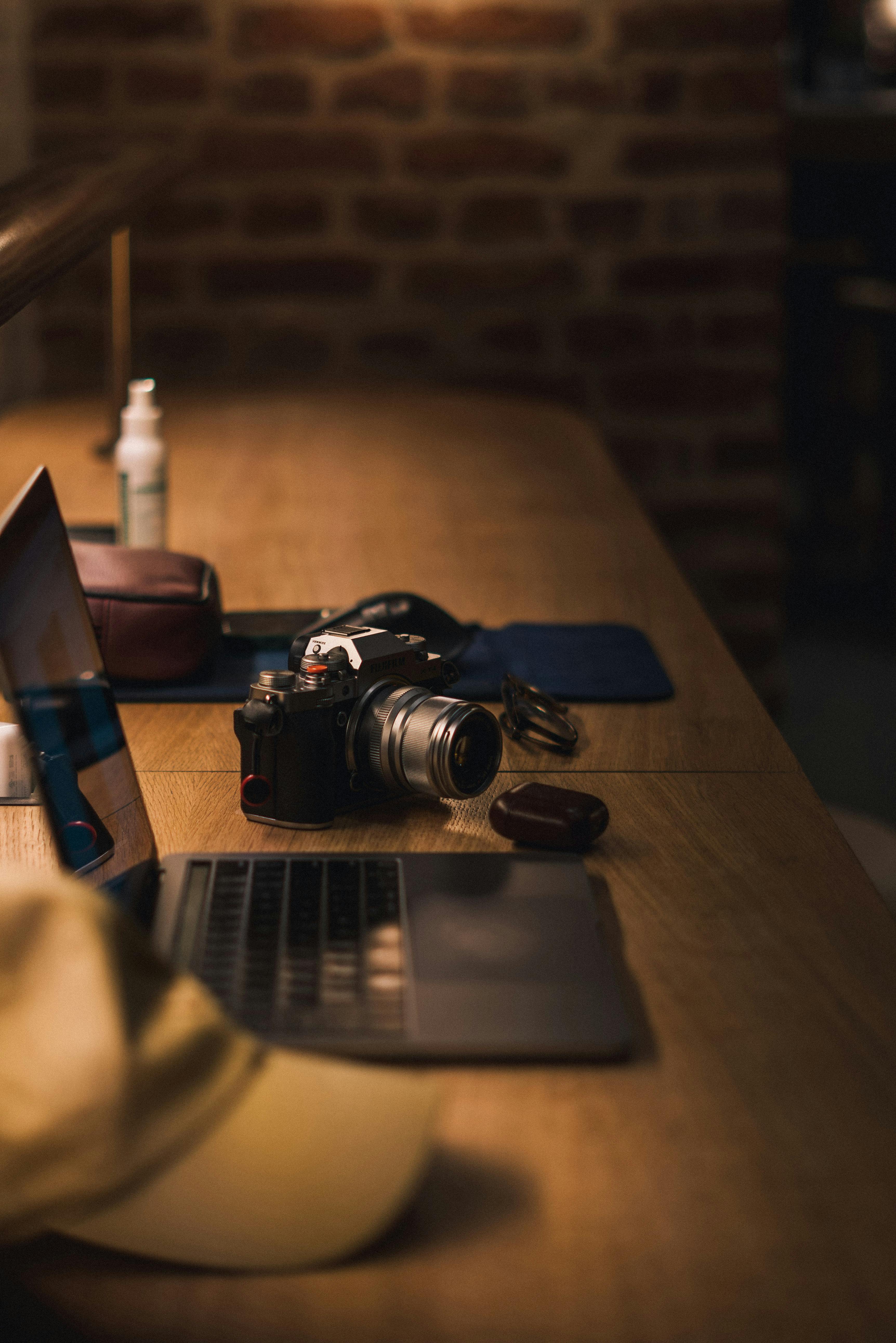 Camera and Laptop on the Desk · Free Stock Photo
