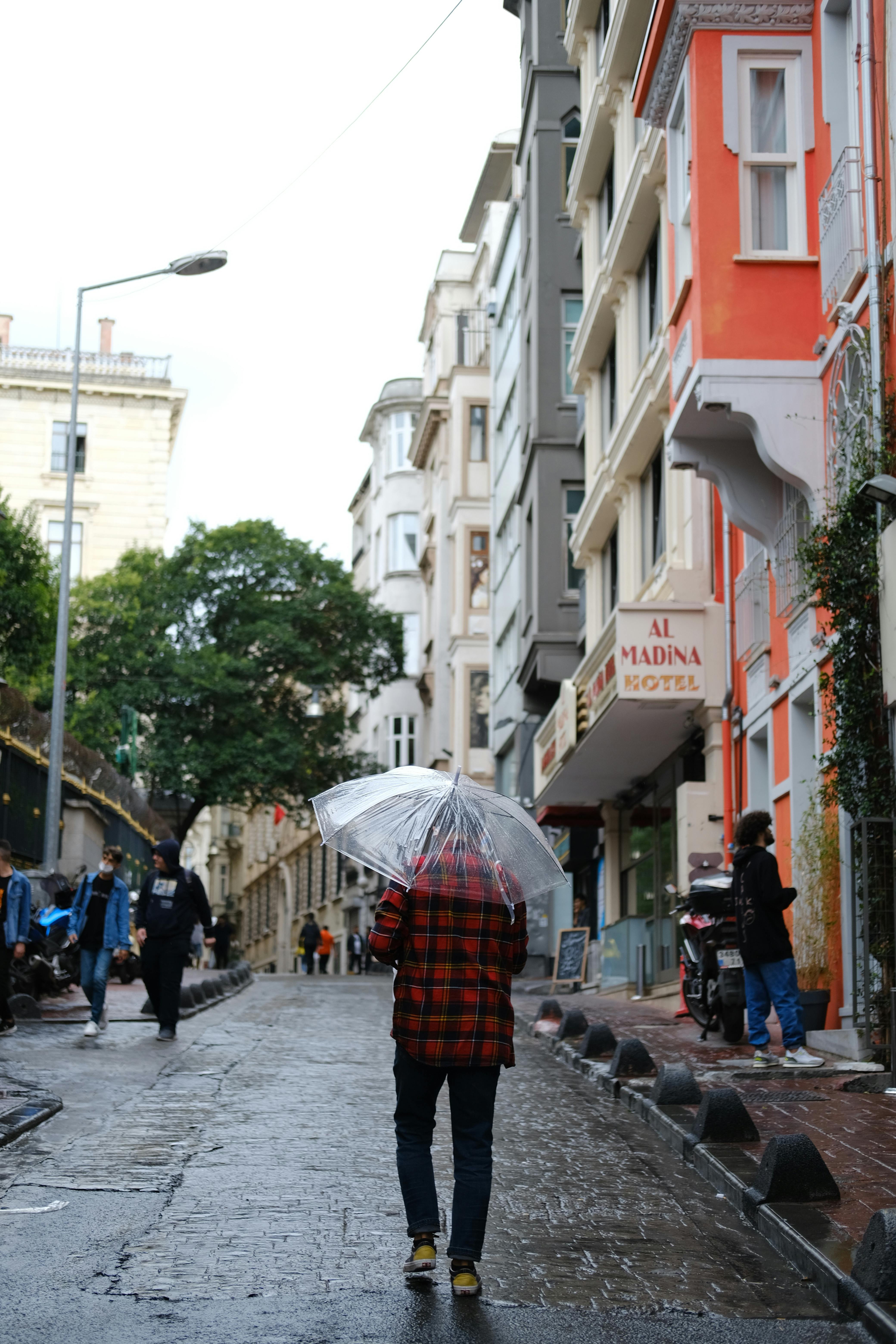 A People Using Umbrella · Free Stock Photo