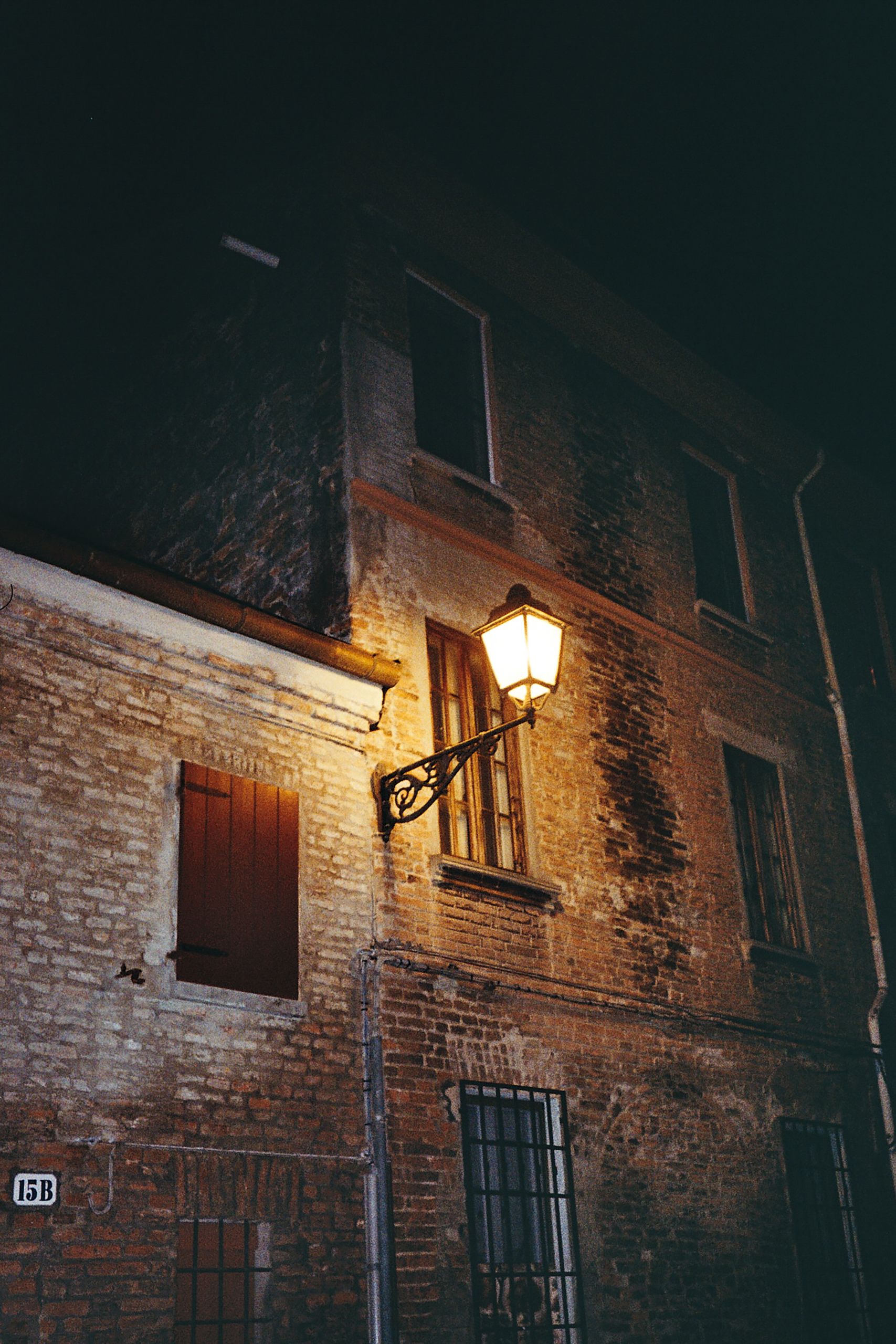 A Brick Building at Night · Free Stock Photo