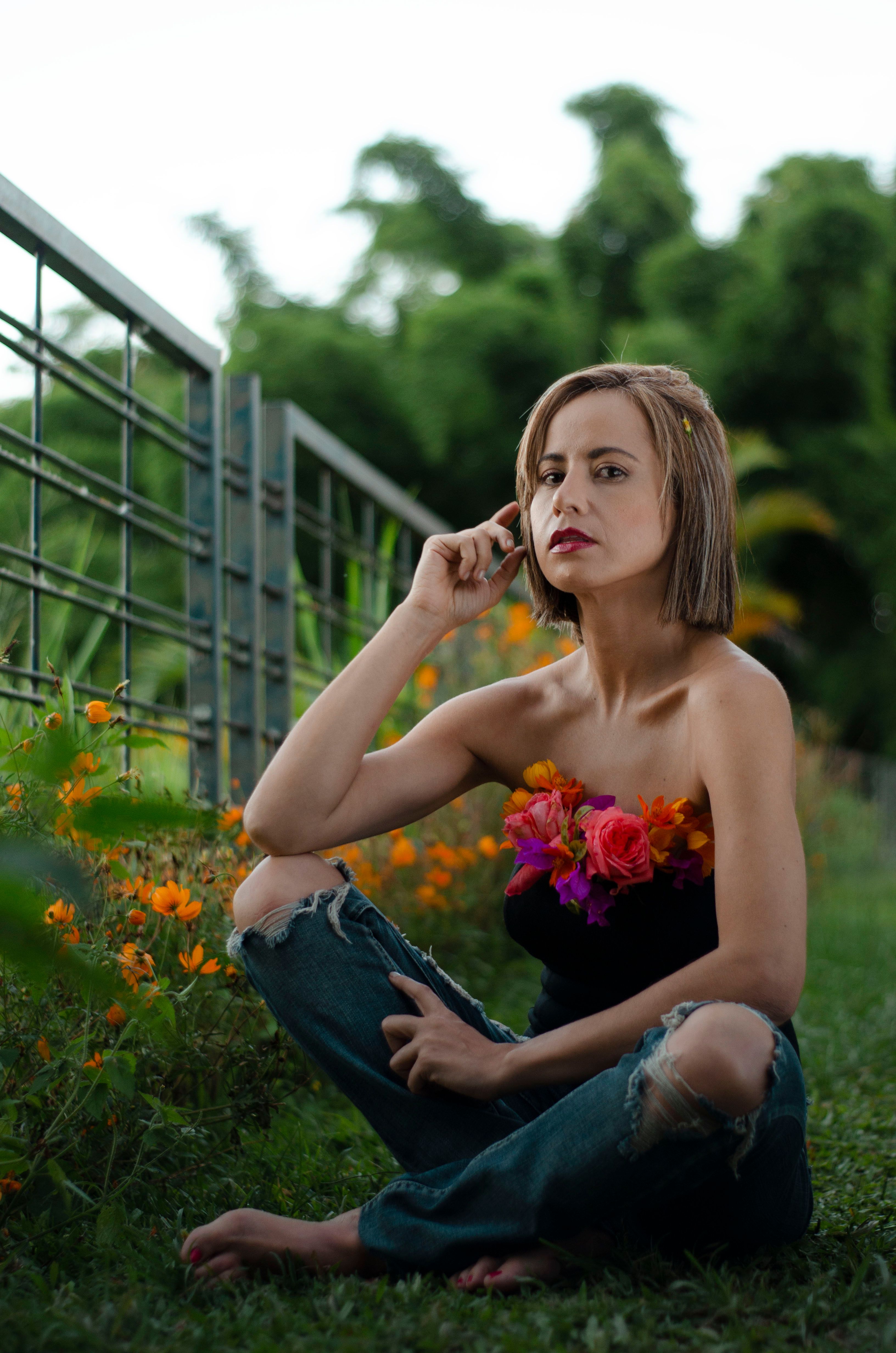 Woman Sitting on the Ground · Free Stock Photo