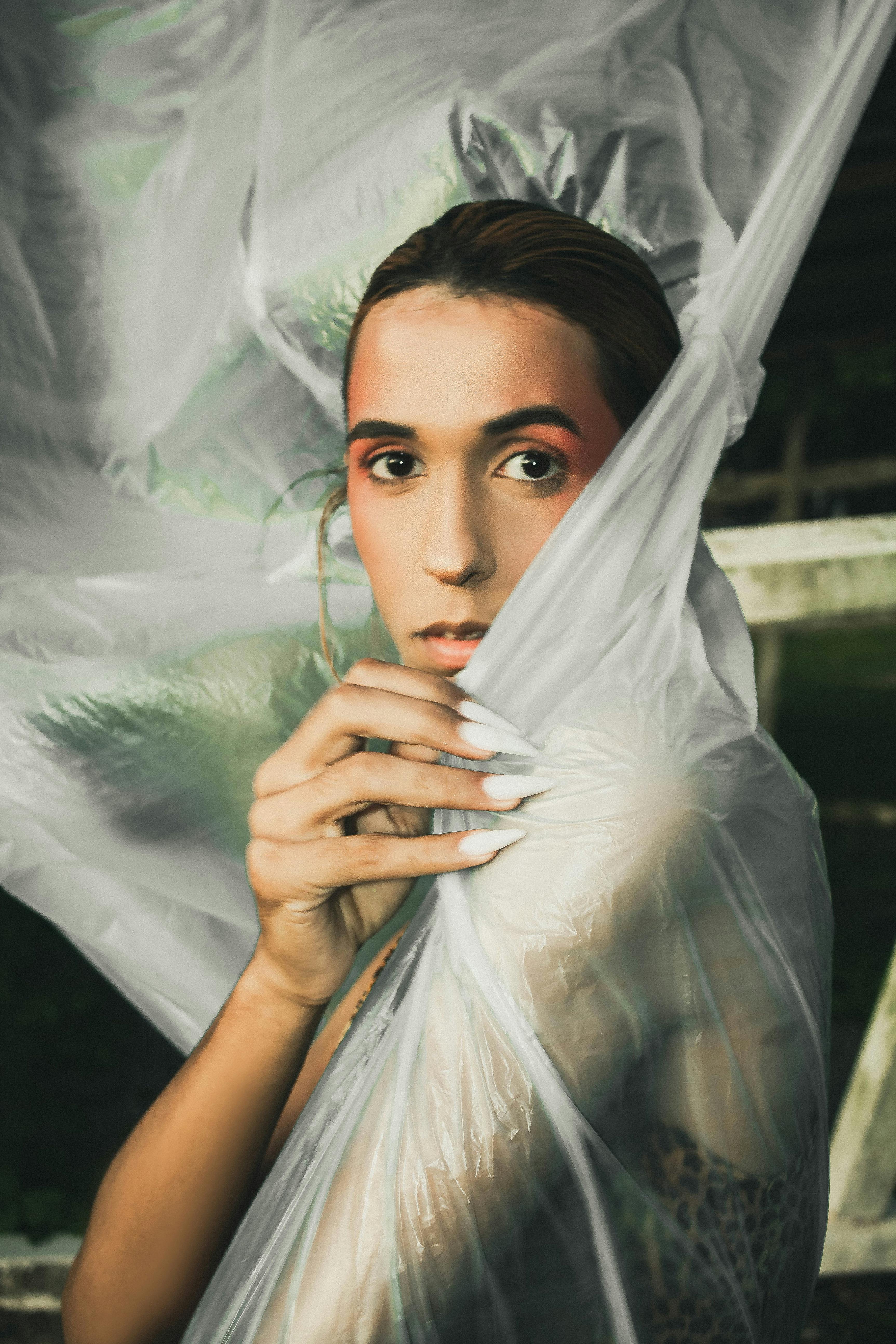 A Woman Wrapped in Plastic · Free Stock Photo
