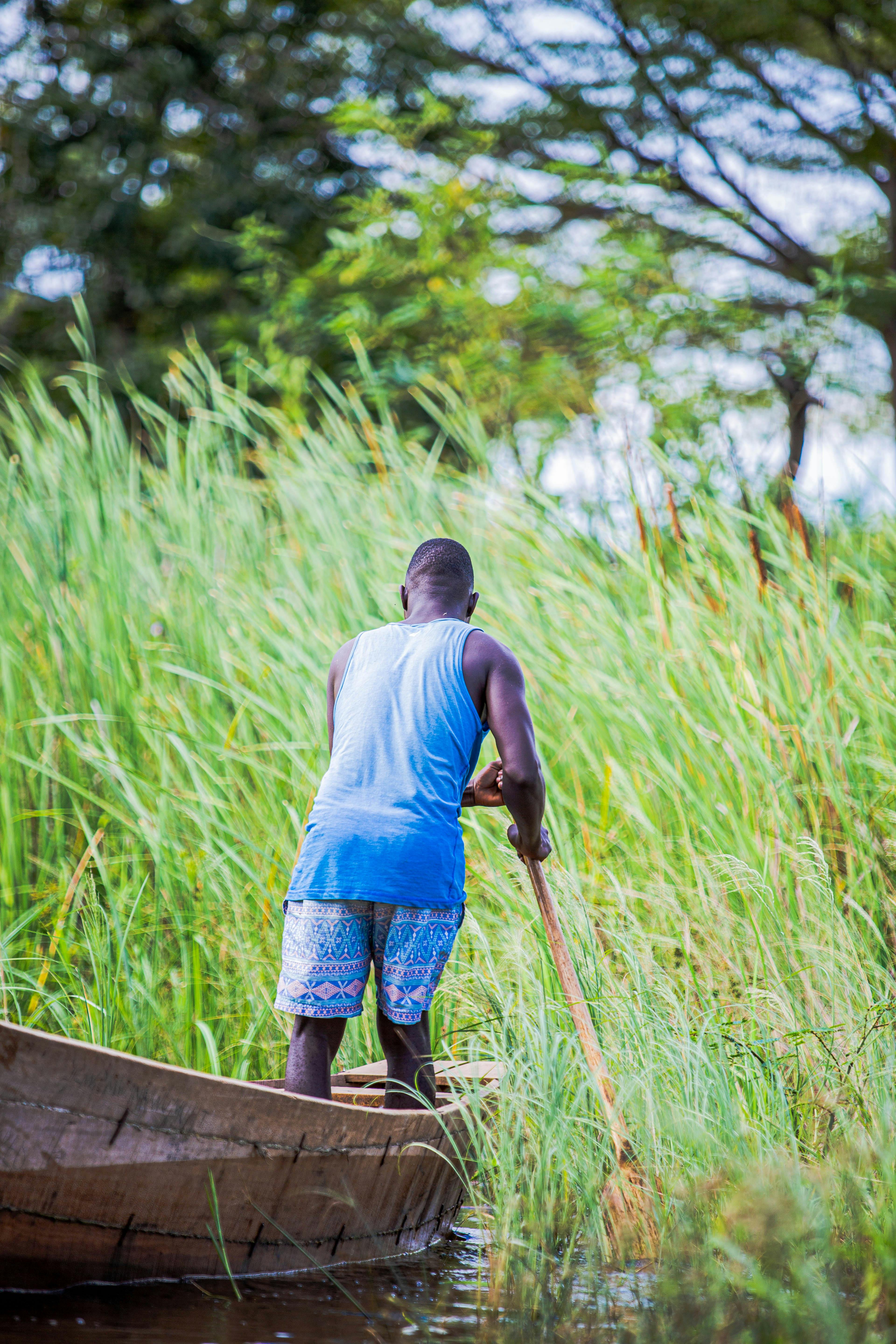 Man Holding an Oar · Free Stock Photo