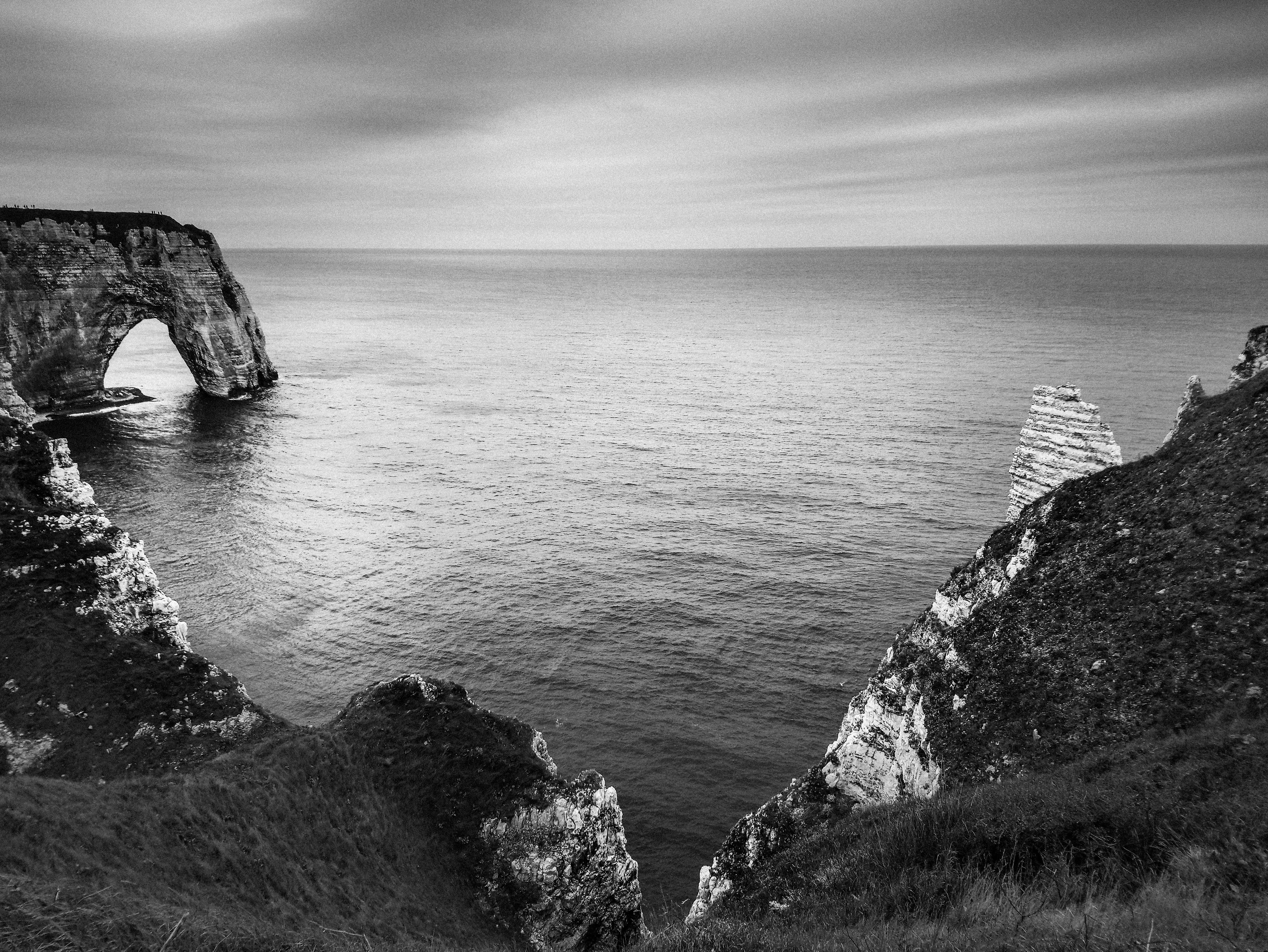 Grayscale Photo of the Sea · Free Stock Photo