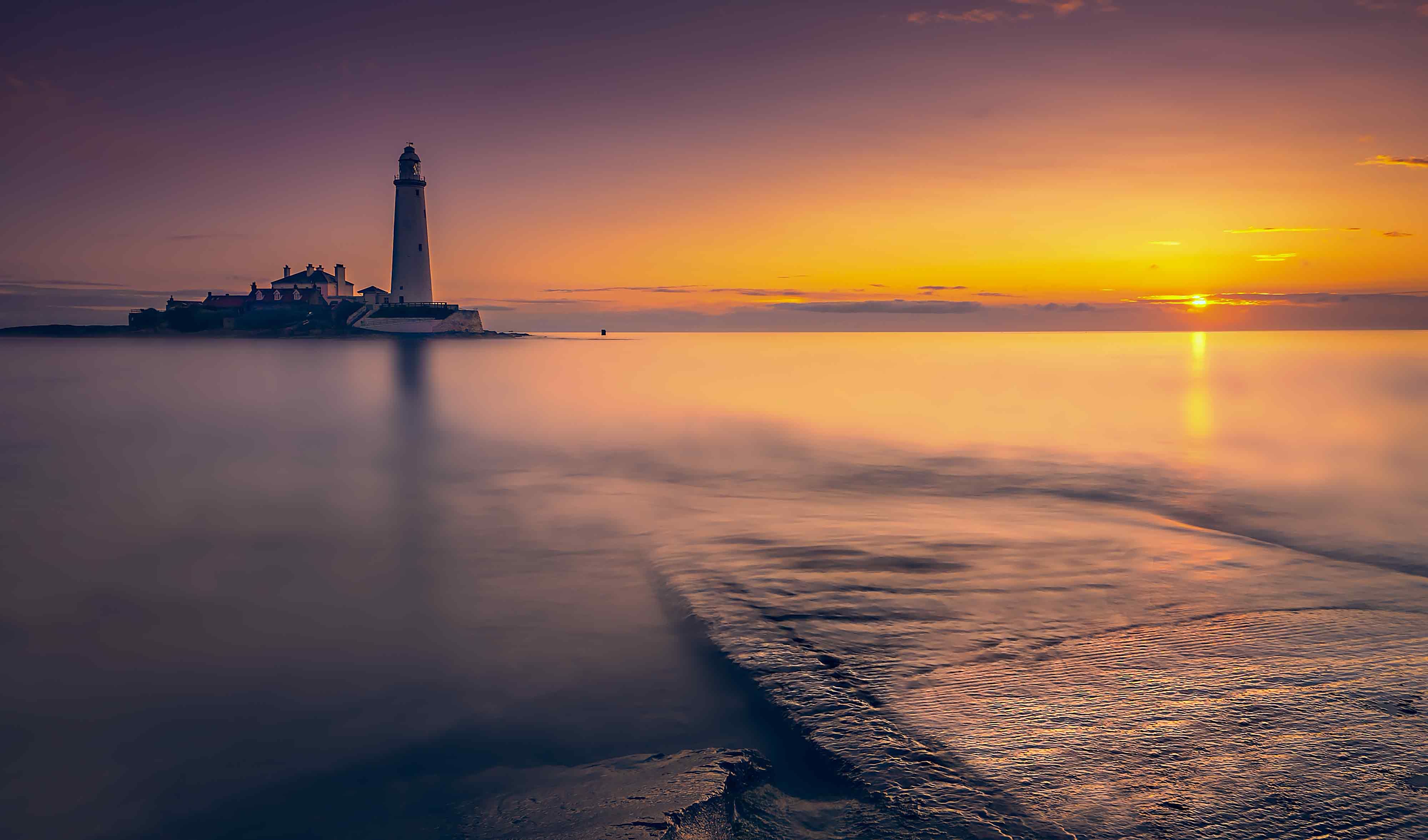 White Lighthouse Tower near Ocean during Sunset · Free Stock Photo
