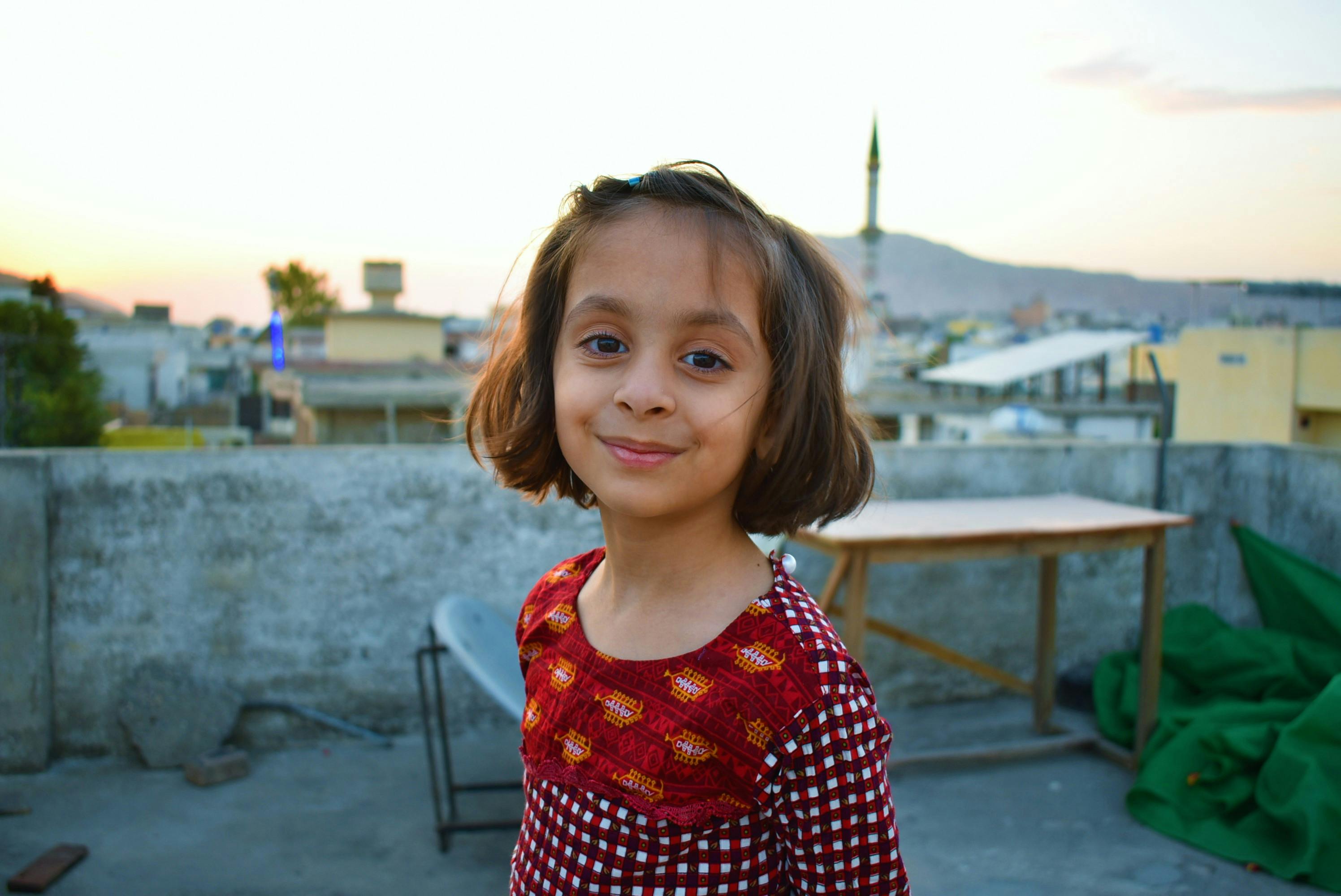 A Young Girl with Smiling Face · Free Stock Photo