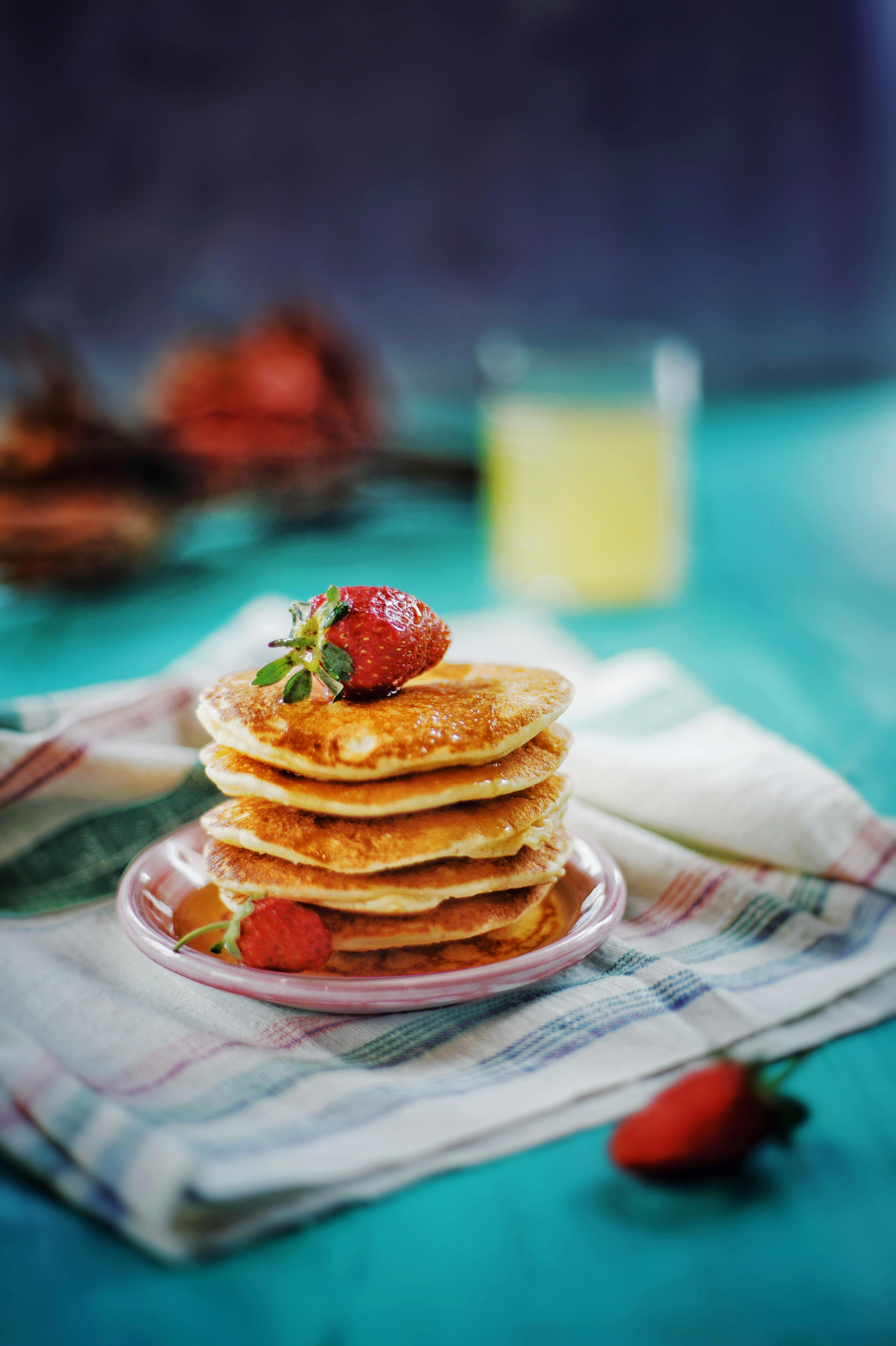 Person Holding Pancakes · Free Stock Photo