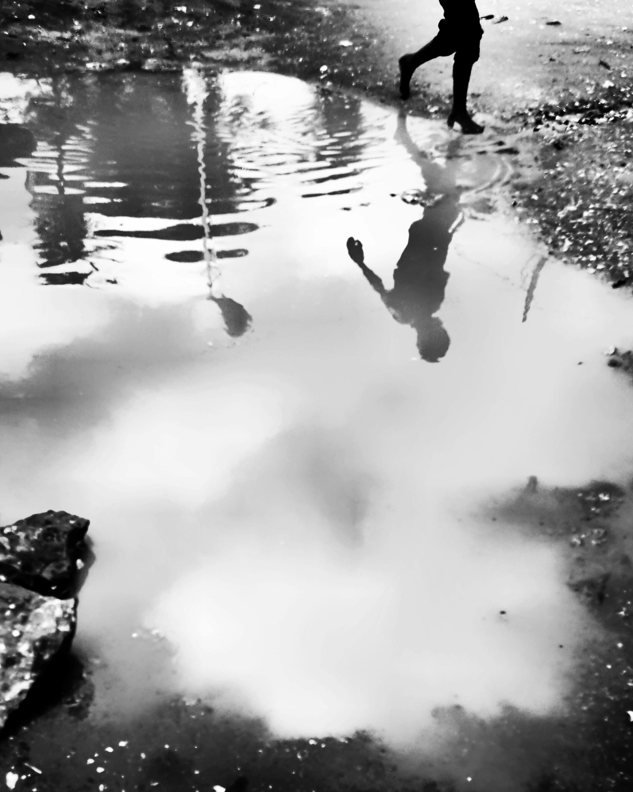 Girl in Wellingtons Standing in Puddle · Free Stock Photo