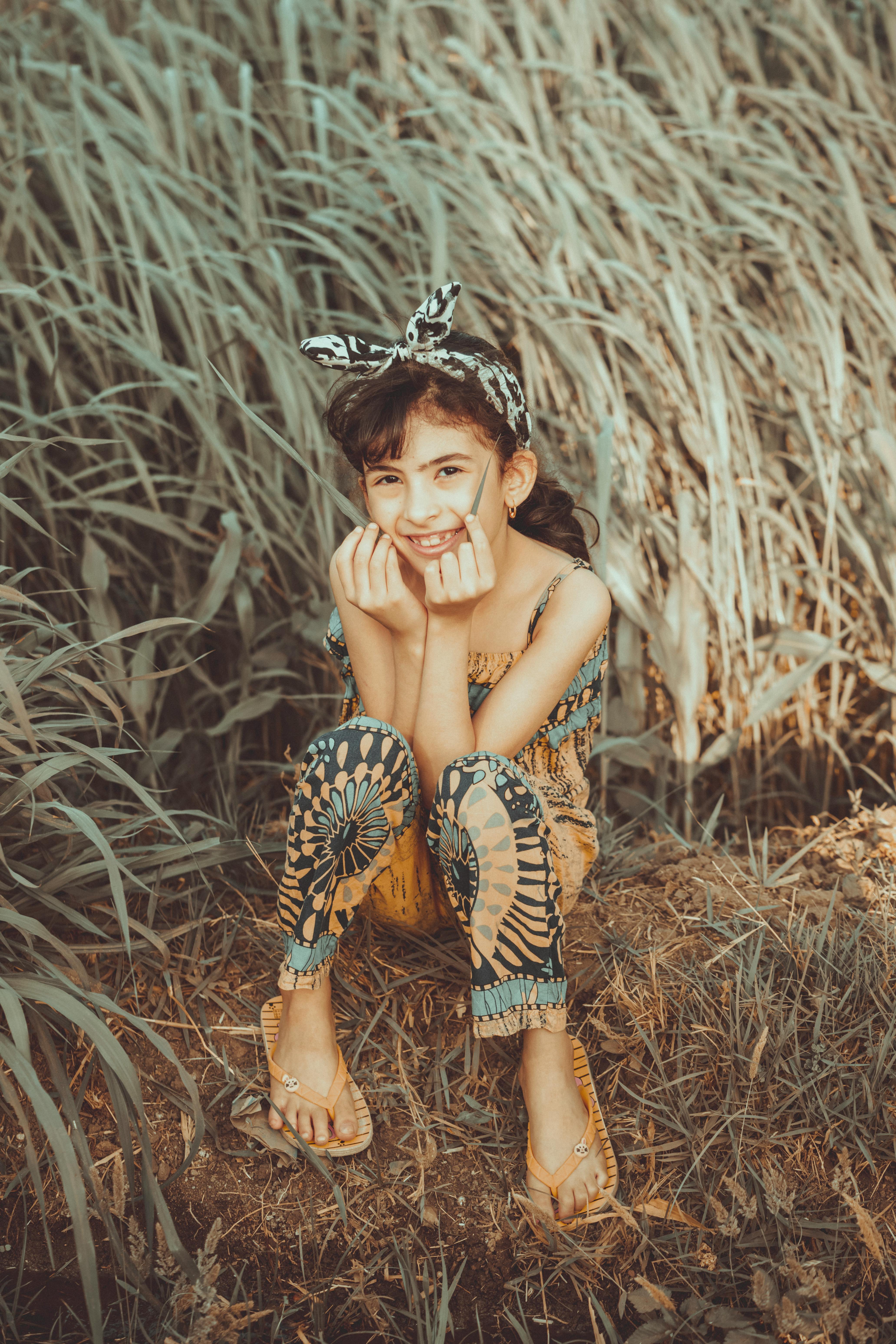 Pretty Girl sitting on Grass · Free Stock Photo