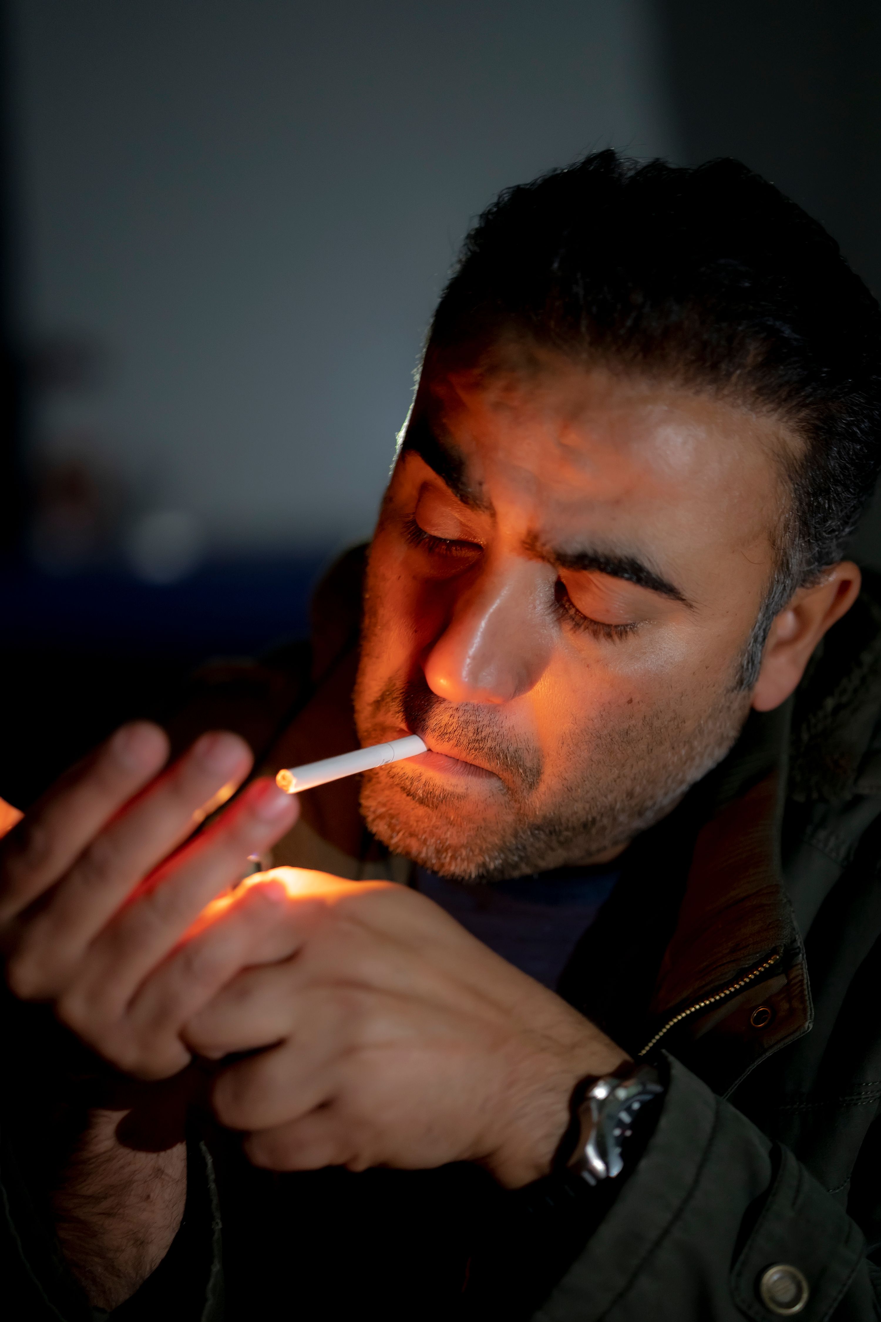 Man Lighting Up a Cigarette · Free Stock Photo