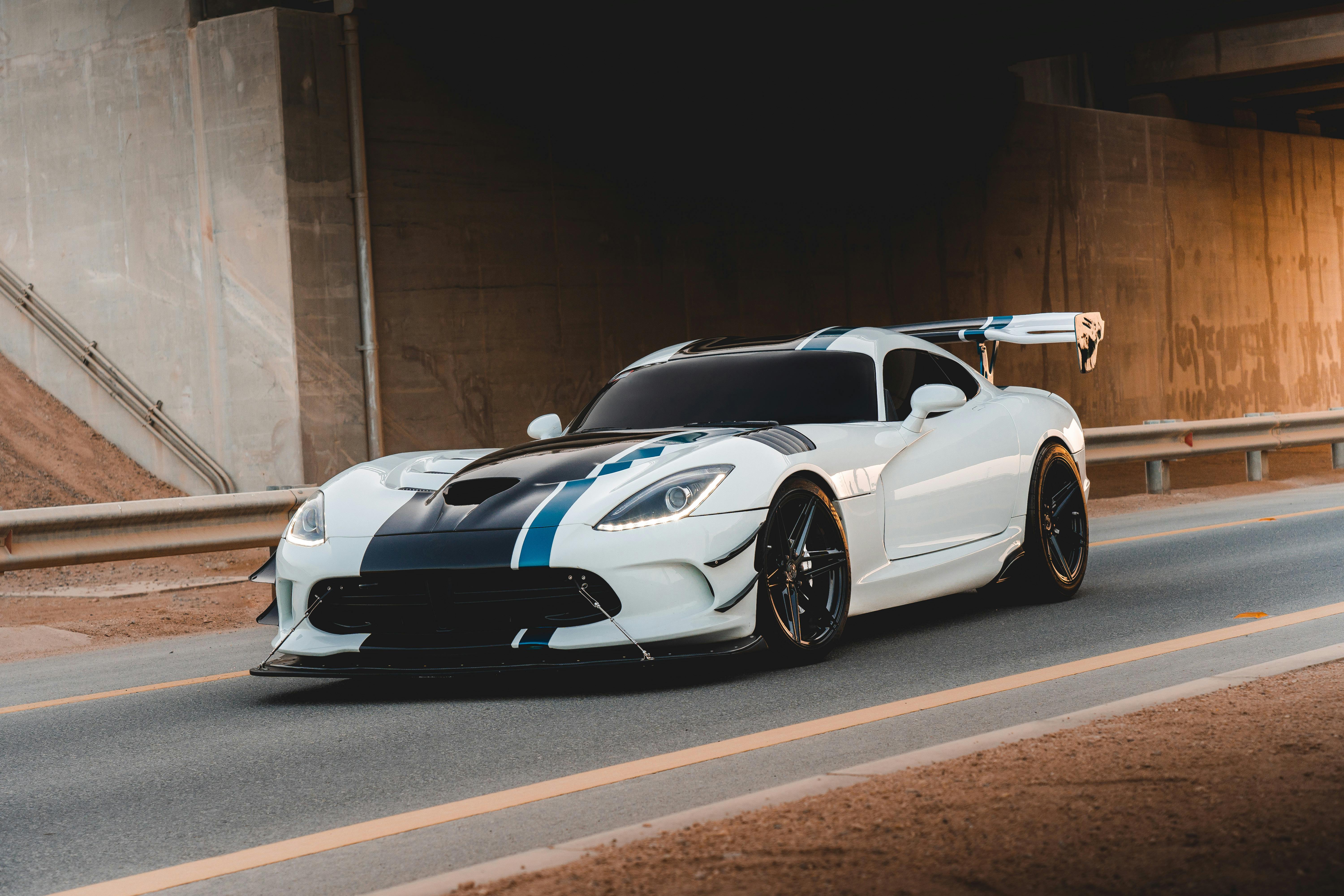 White Sports Car on Asphalt Road · Free Stock Photo