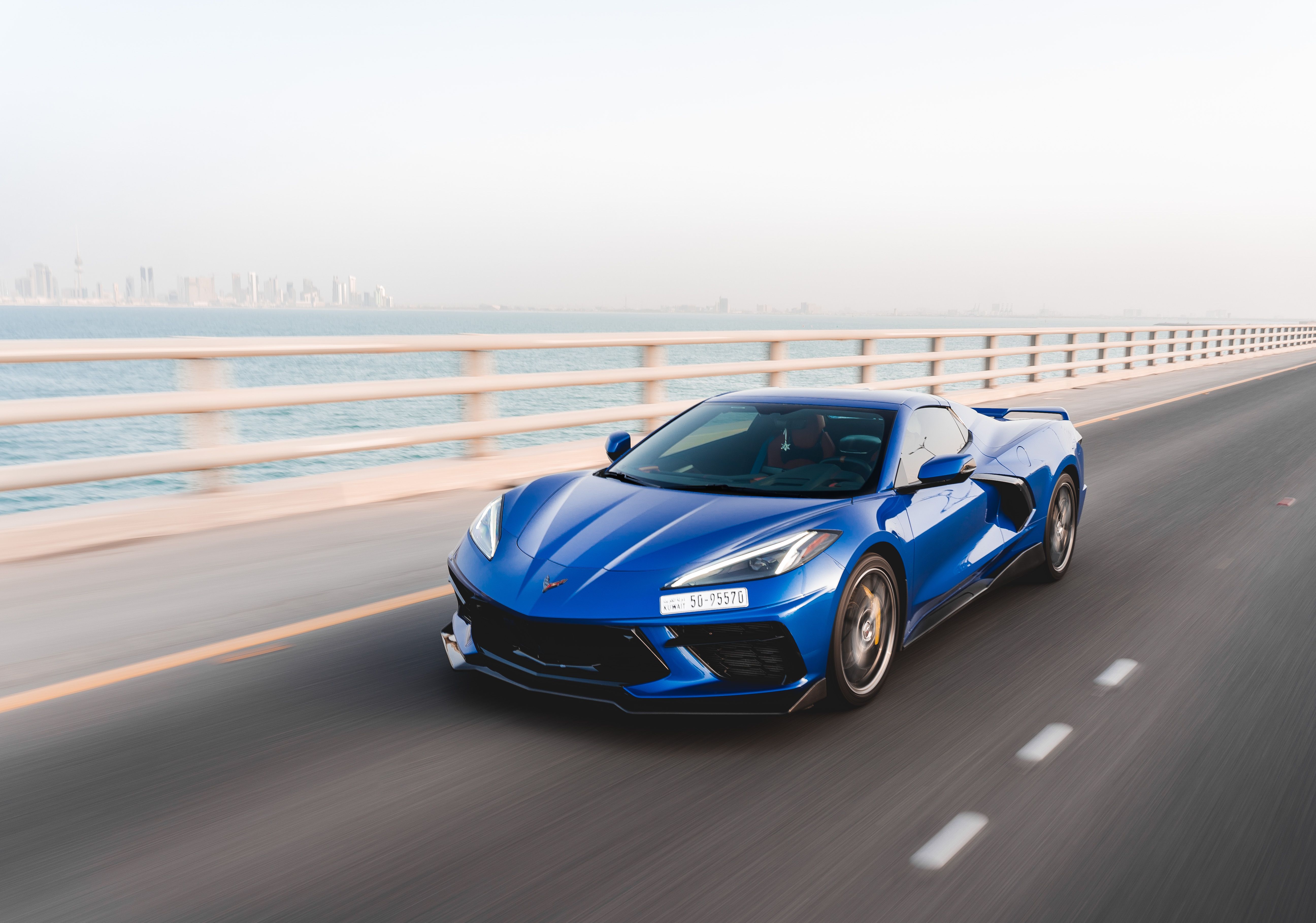 Dynamic Blue Sports Car on Highway · Free Stock Photo