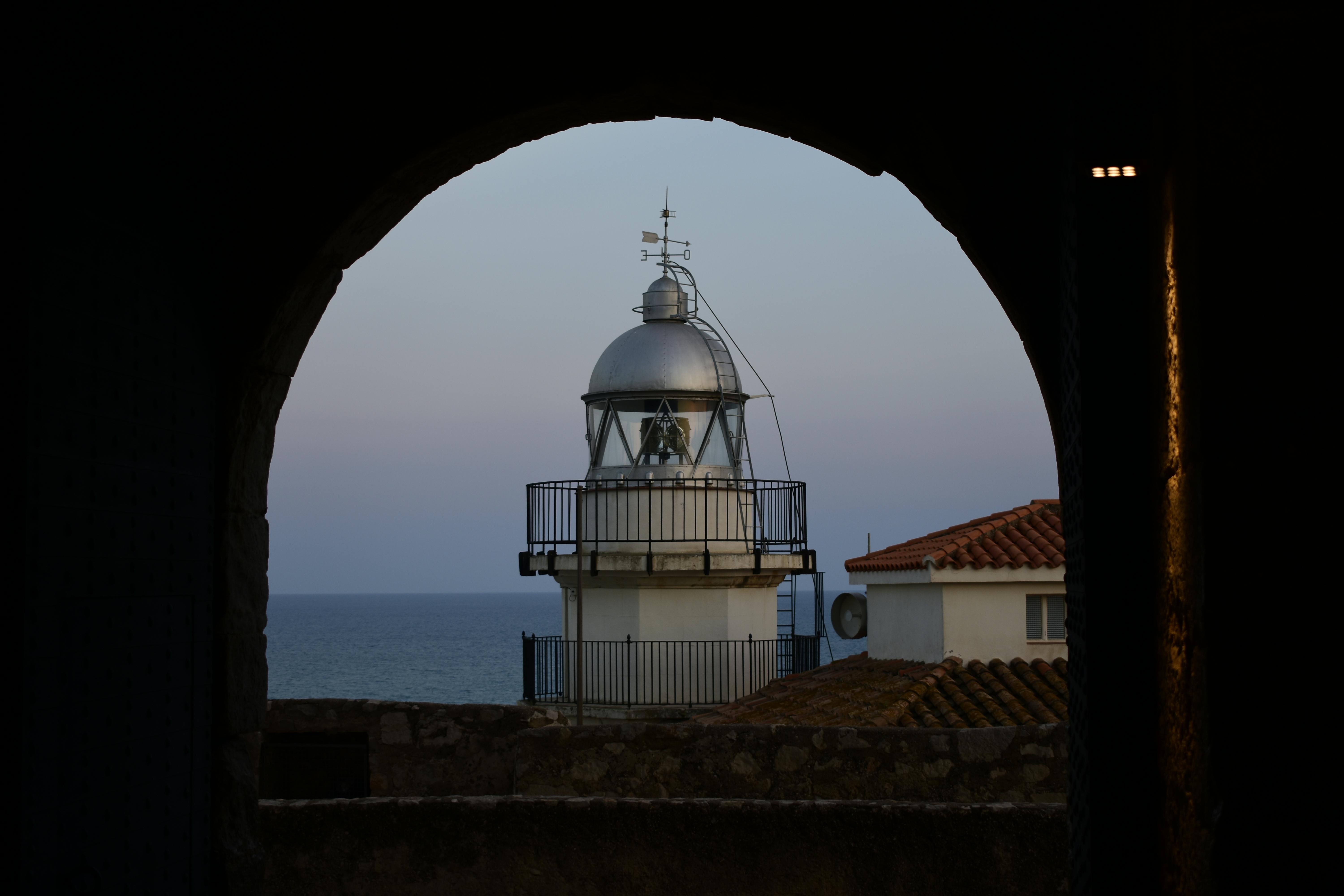 A Lighthouse Near the Ocean · Free Stock Photo