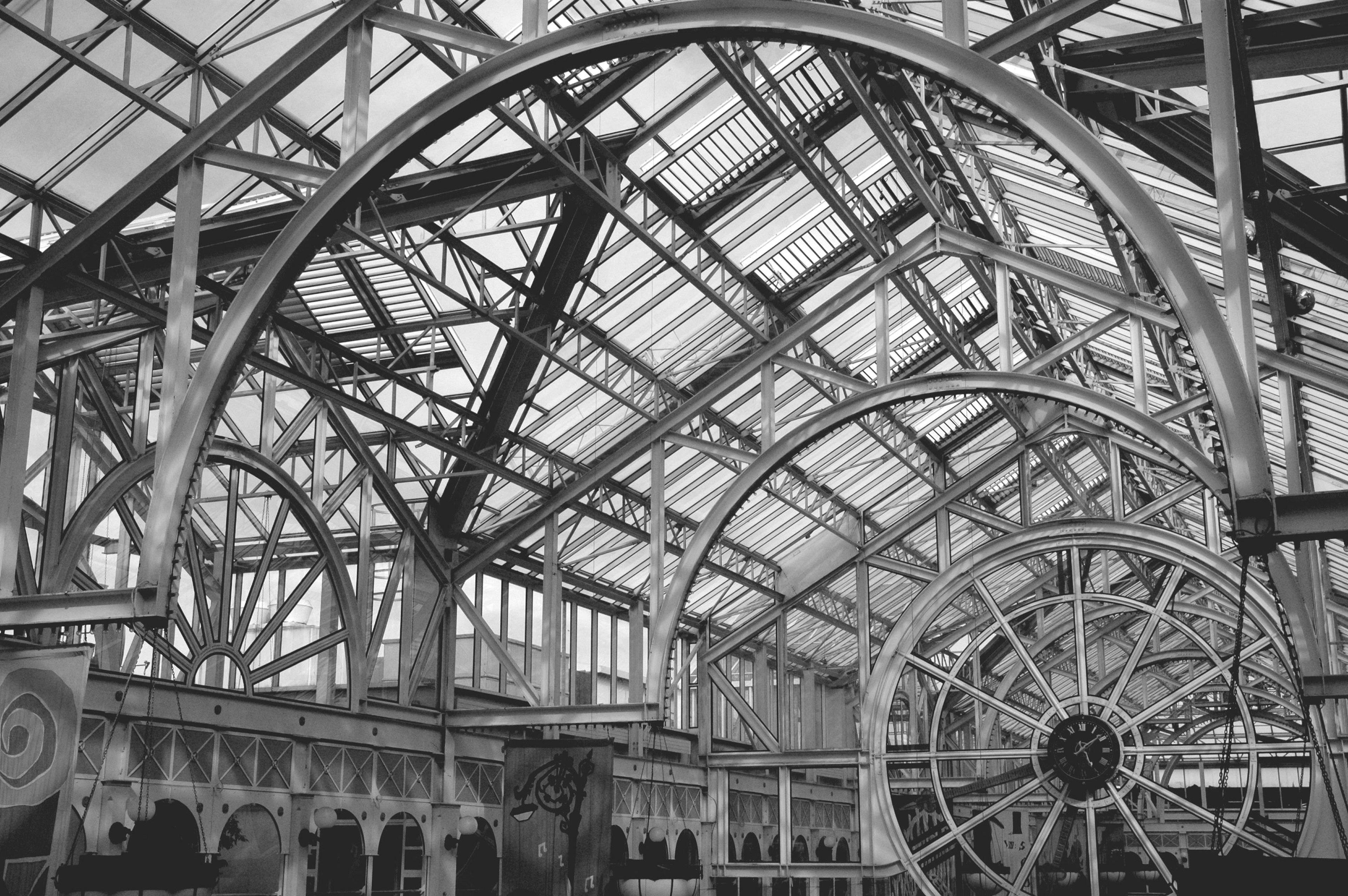 Grayscale Photo of a Steel Structure · Free Stock Photo