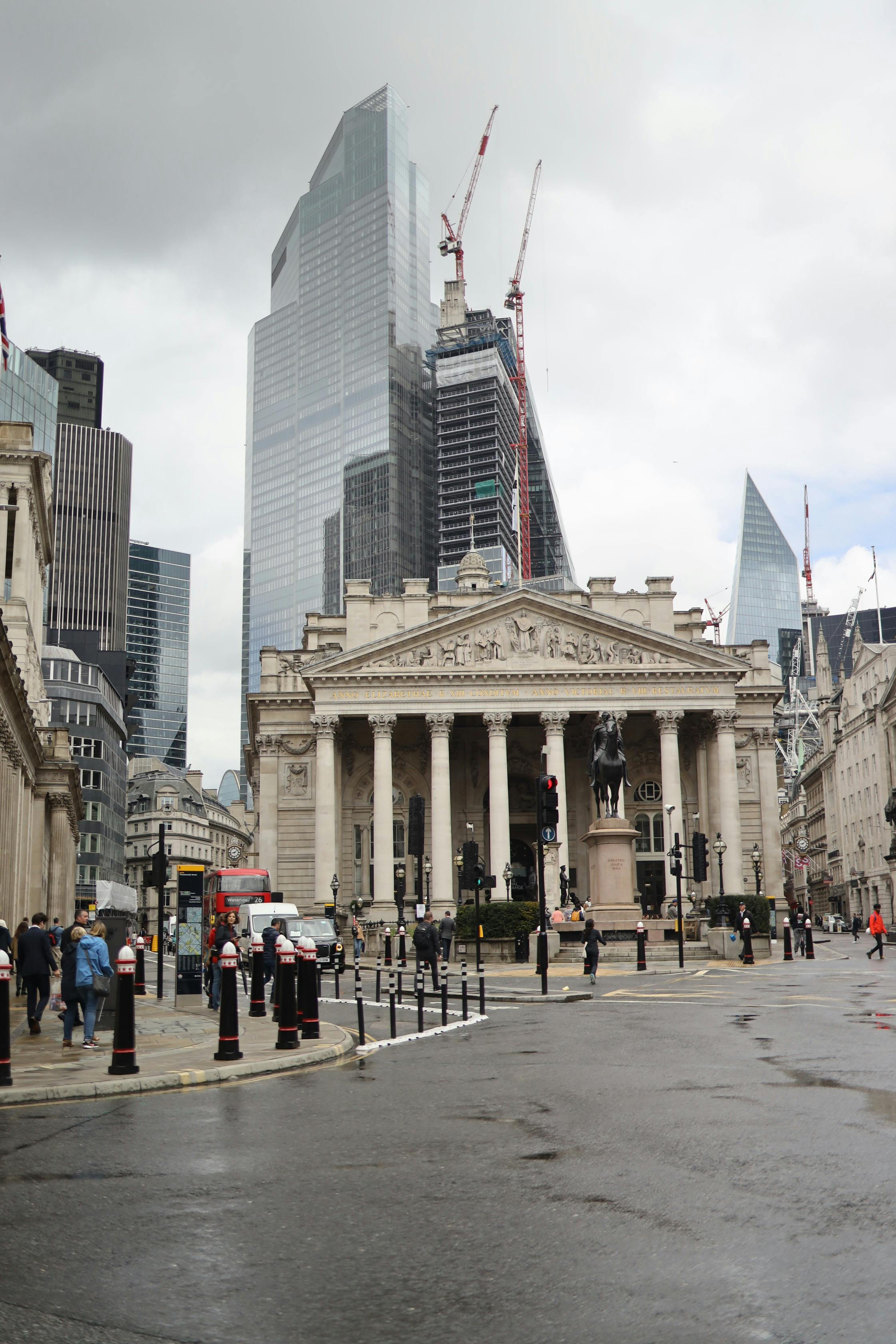 People Walking on Street Near High Rise Buildings · Free Stock Photo