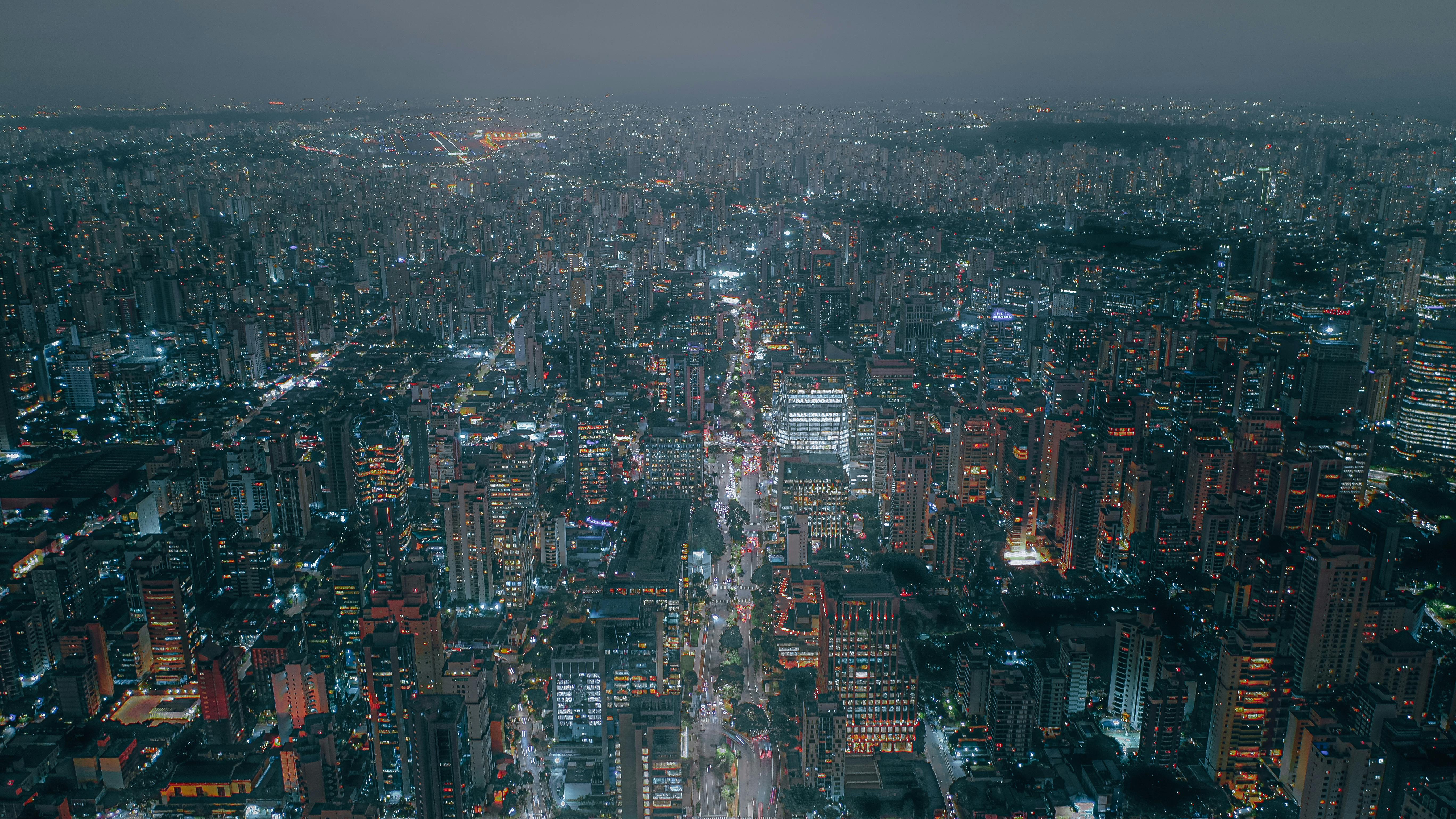 Aerial View of City Buildings during Night Time · Free Stock Photo