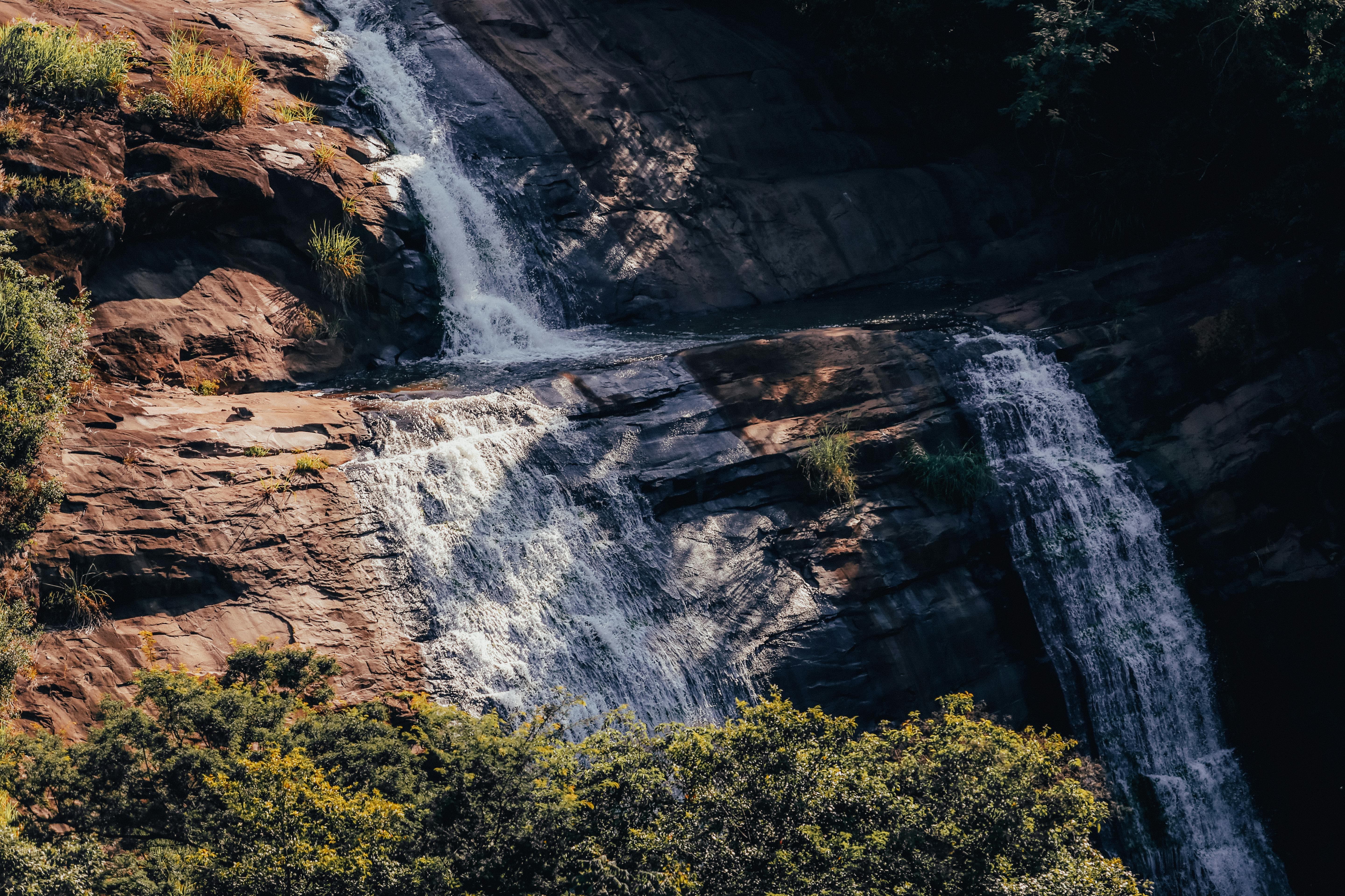 Waterfalls Beside Bridge · Free Stock Photo