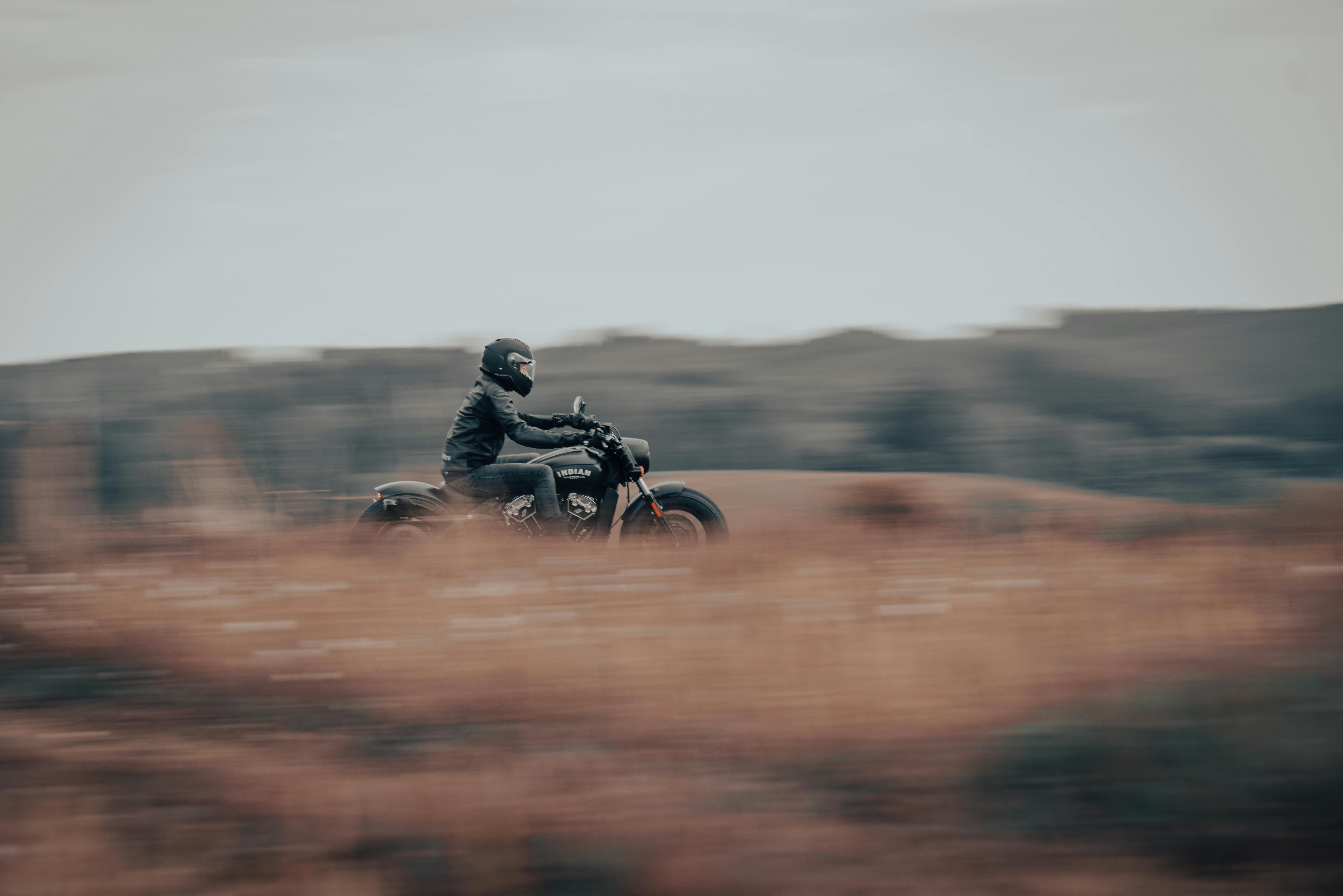Man Riding a Motorcycle · Free Stock Photo