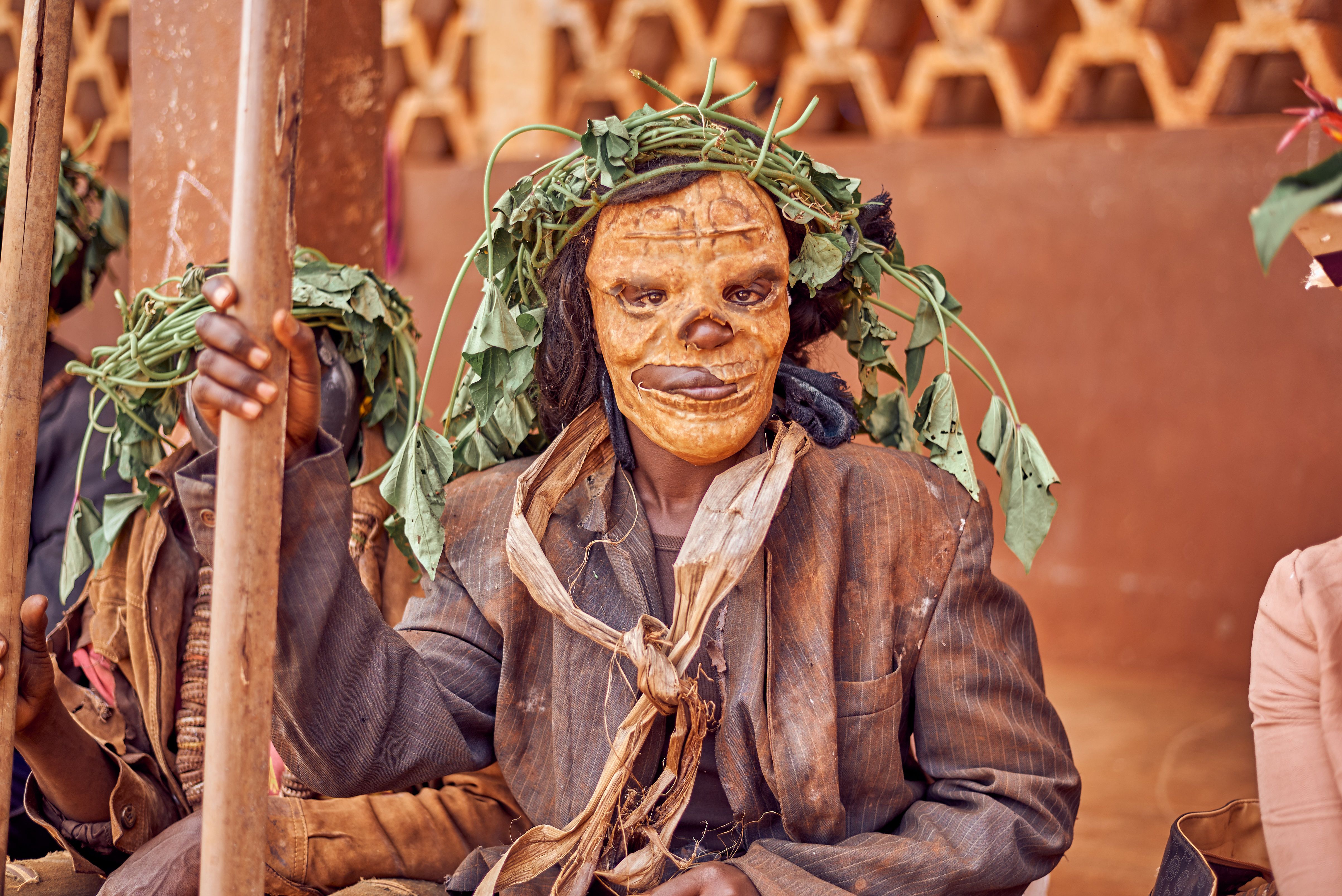 Person in a Mask and Costume Sitting during a Traditional Tribal ...