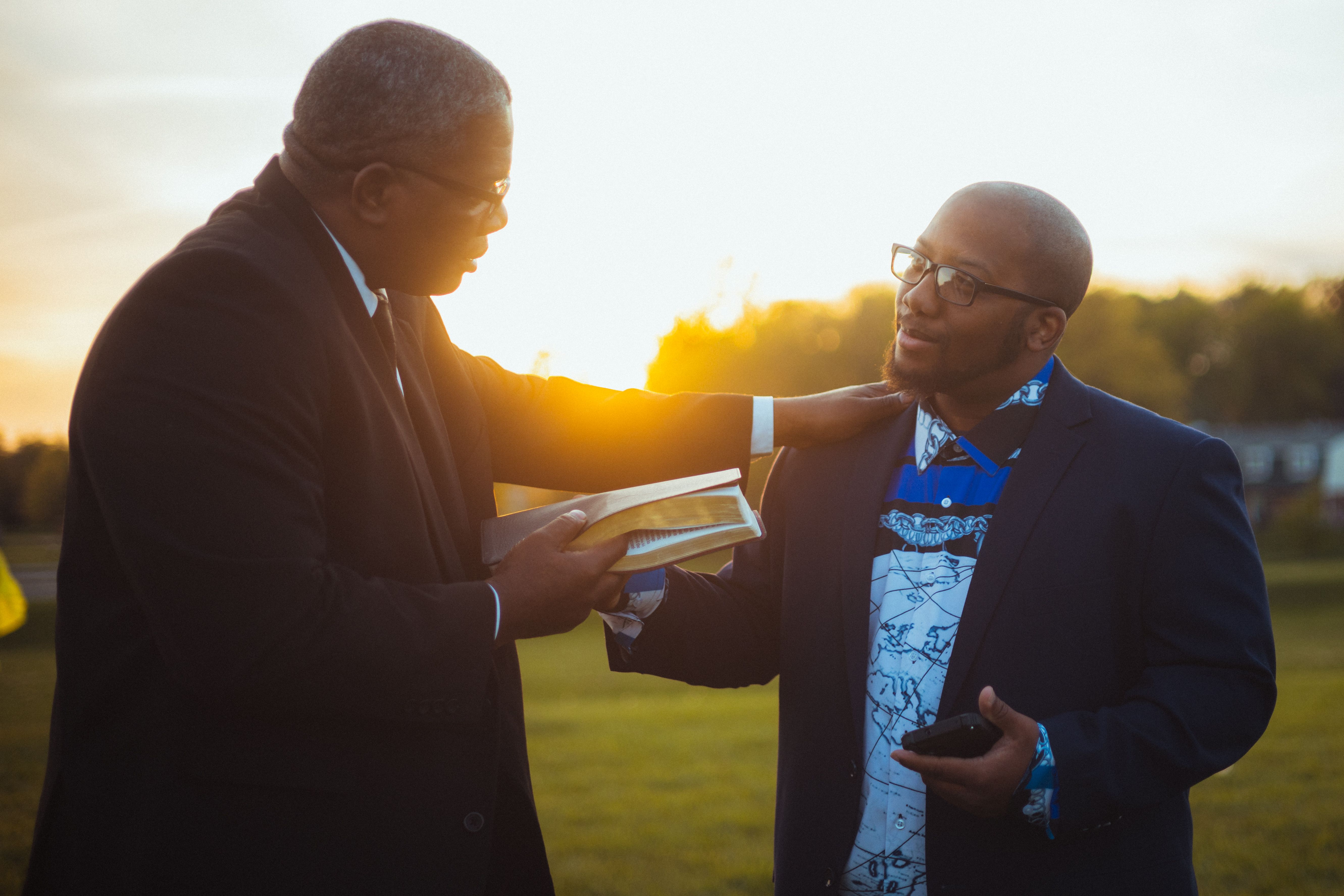 Two Men in Black Suit Talking Together · Free Stock Photo