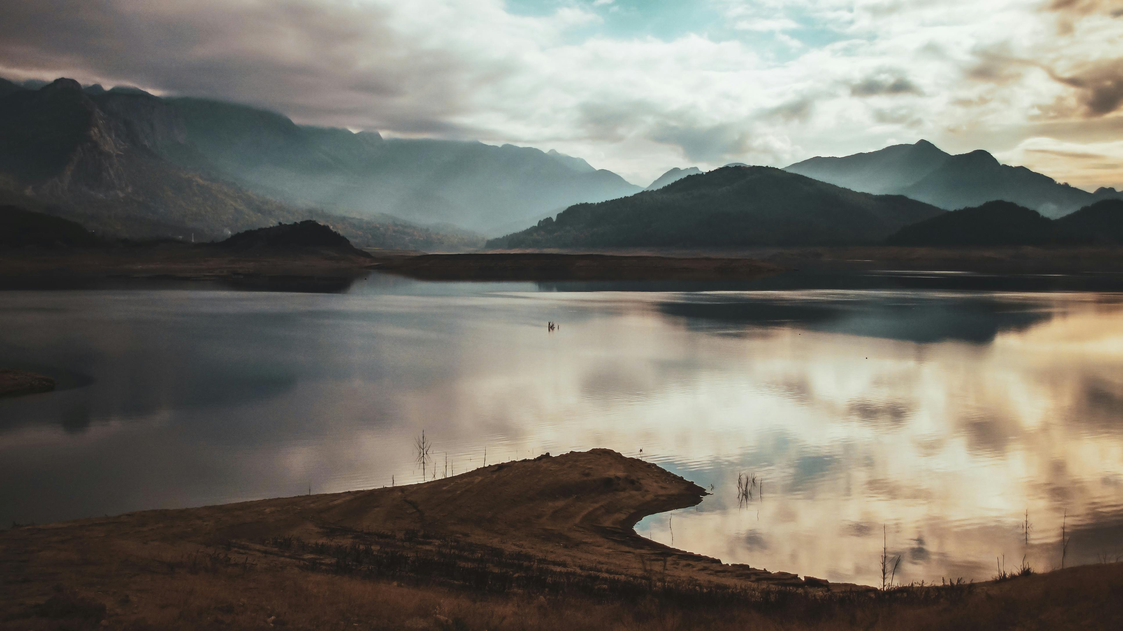 Aerial View of Wide River at Sunset · Free Stock Photo