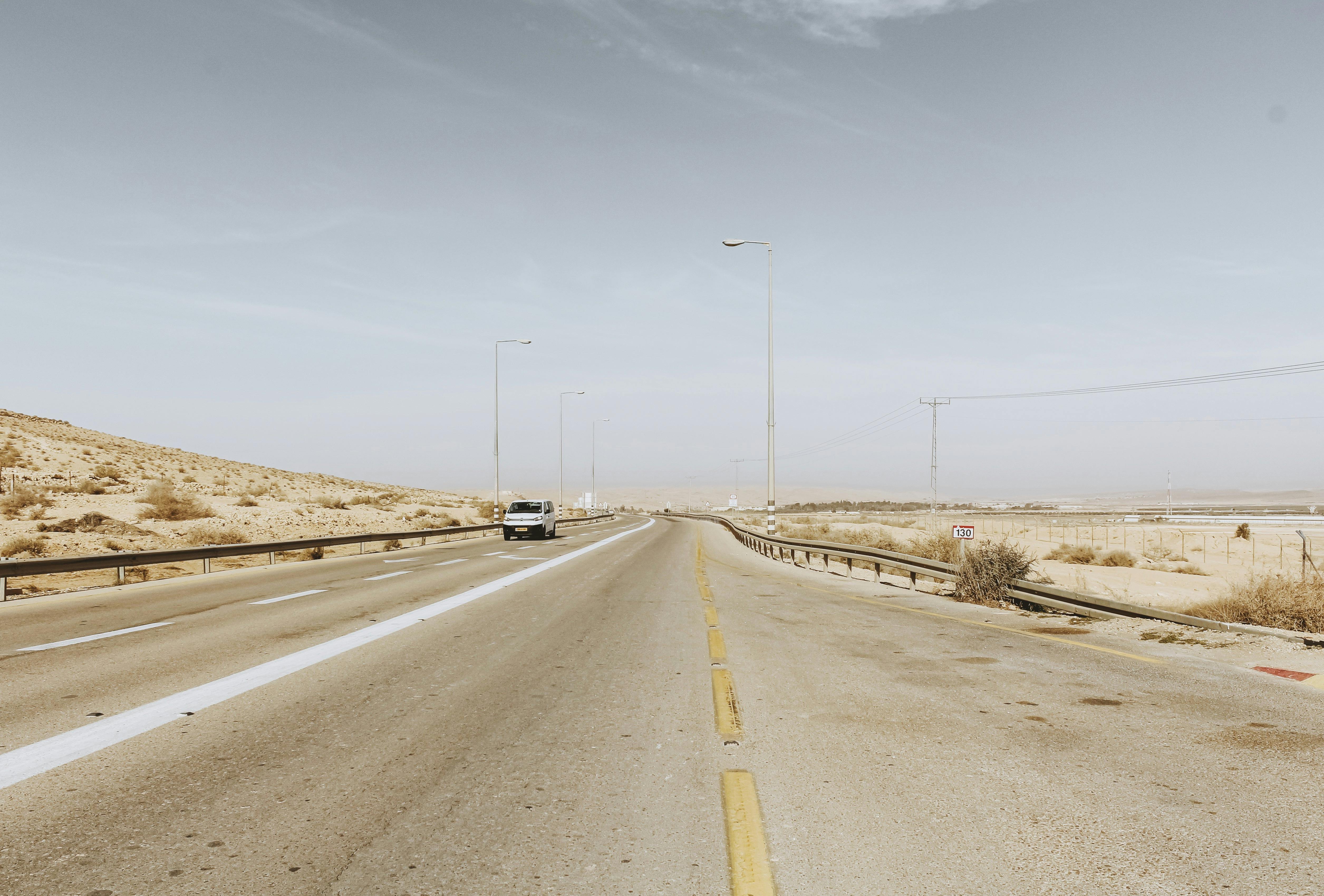White Car on Empty Road · Free Stock Photo