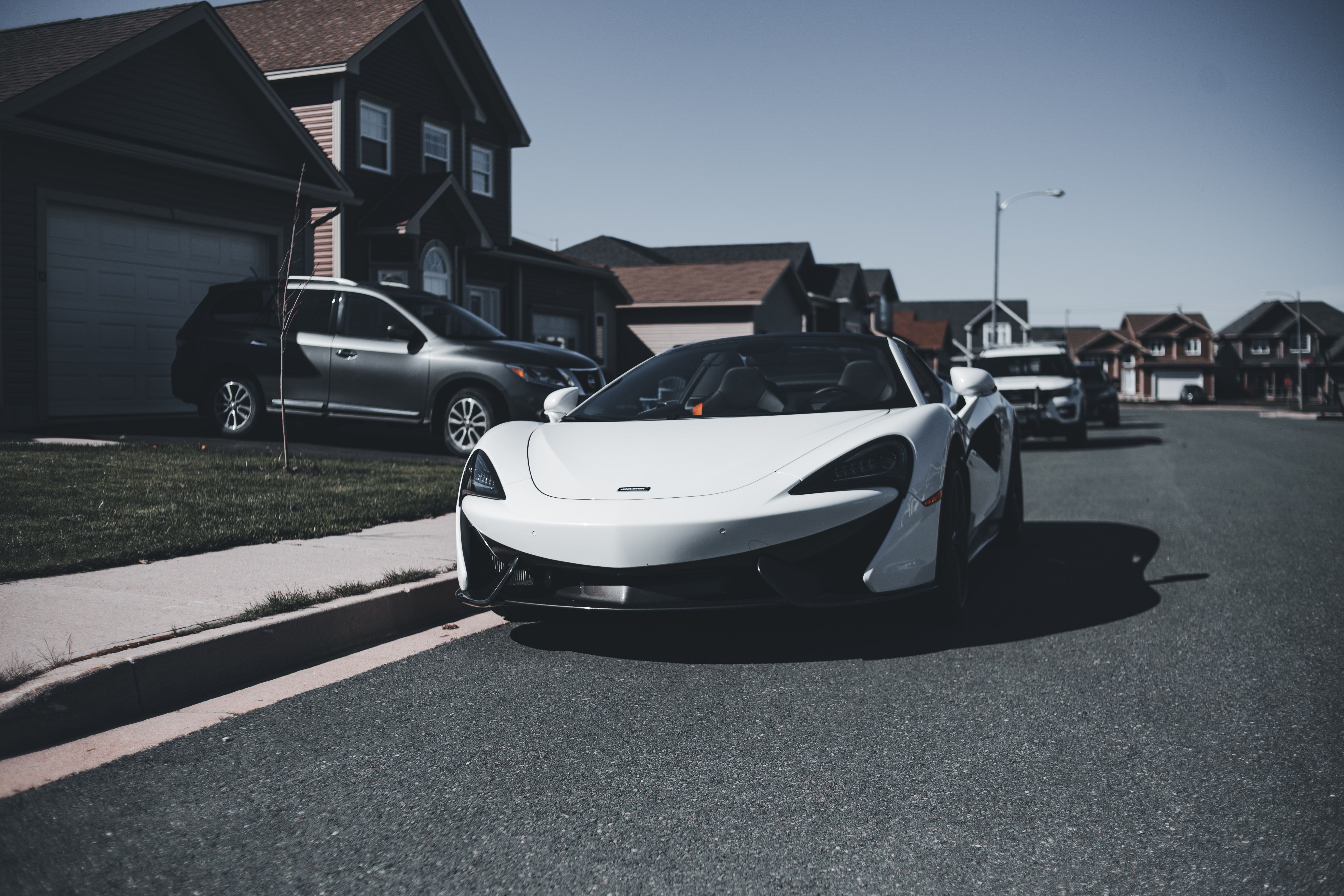 White McLaren 570S Parked on the Side of the Street · Free Stock Photo
