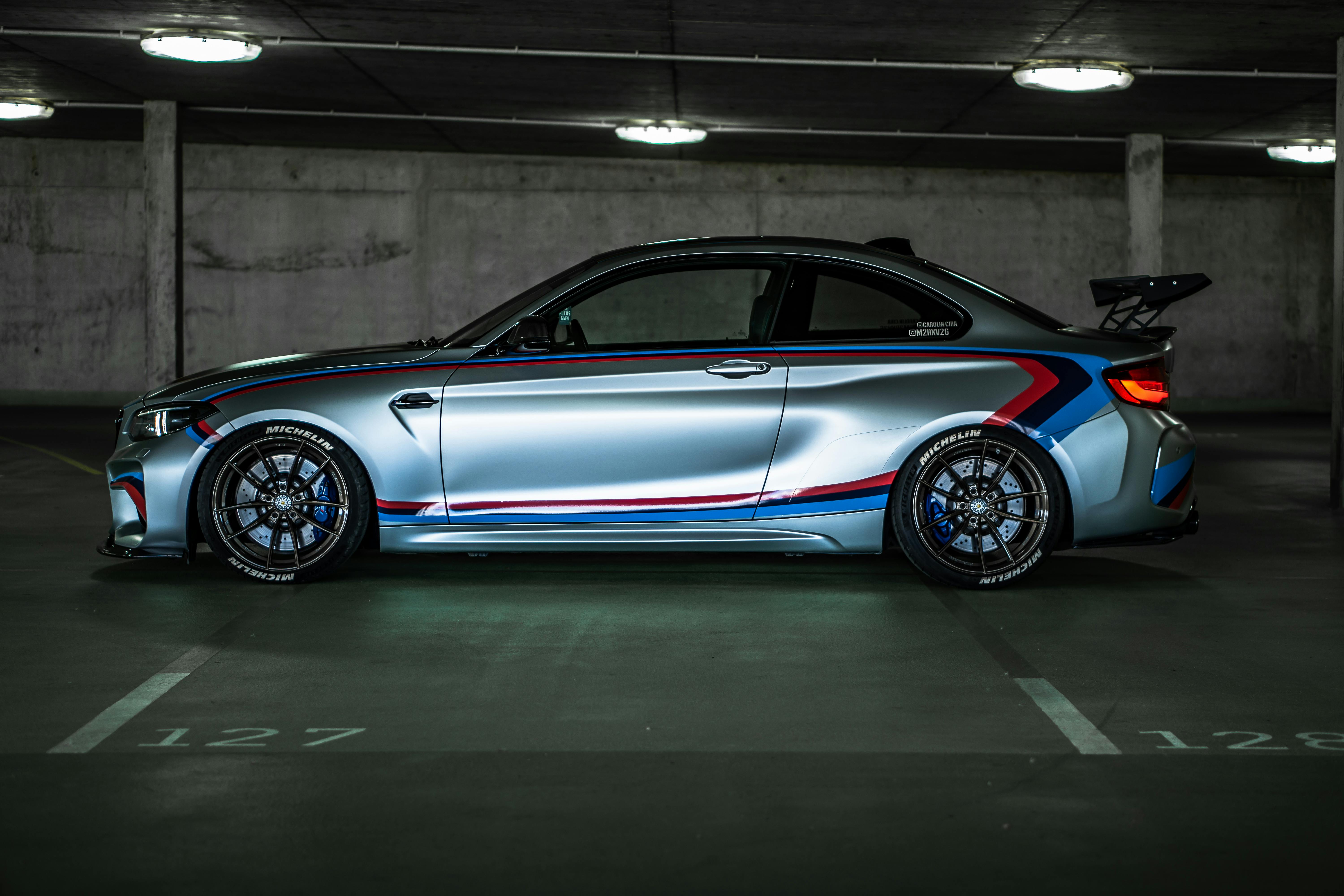 Side View Shot of BMW M2 Parked in the Garage · Free Stock Photo