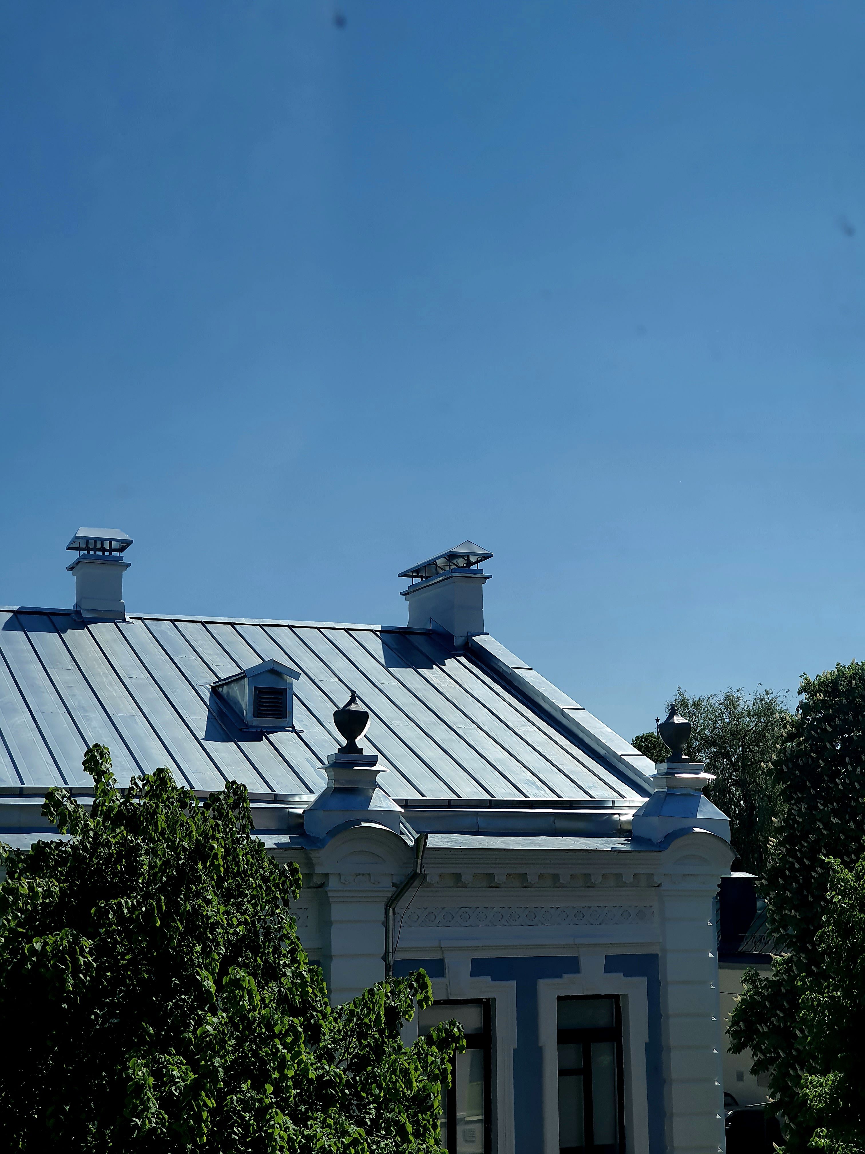 Exterior of a House Under Blue Sky · Free Stock Photo