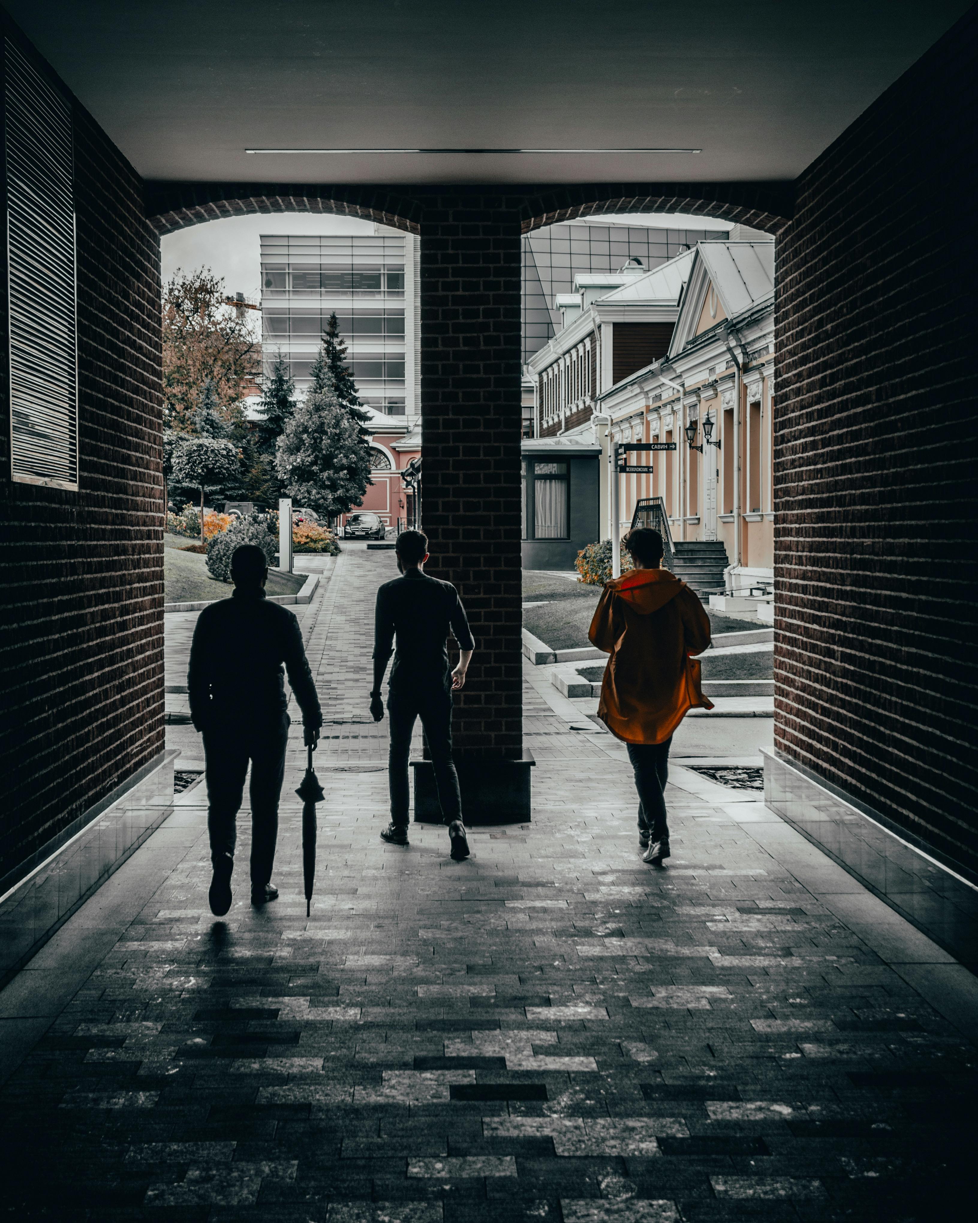 Photo of People Walking by a City Passage · Free Stock Photo