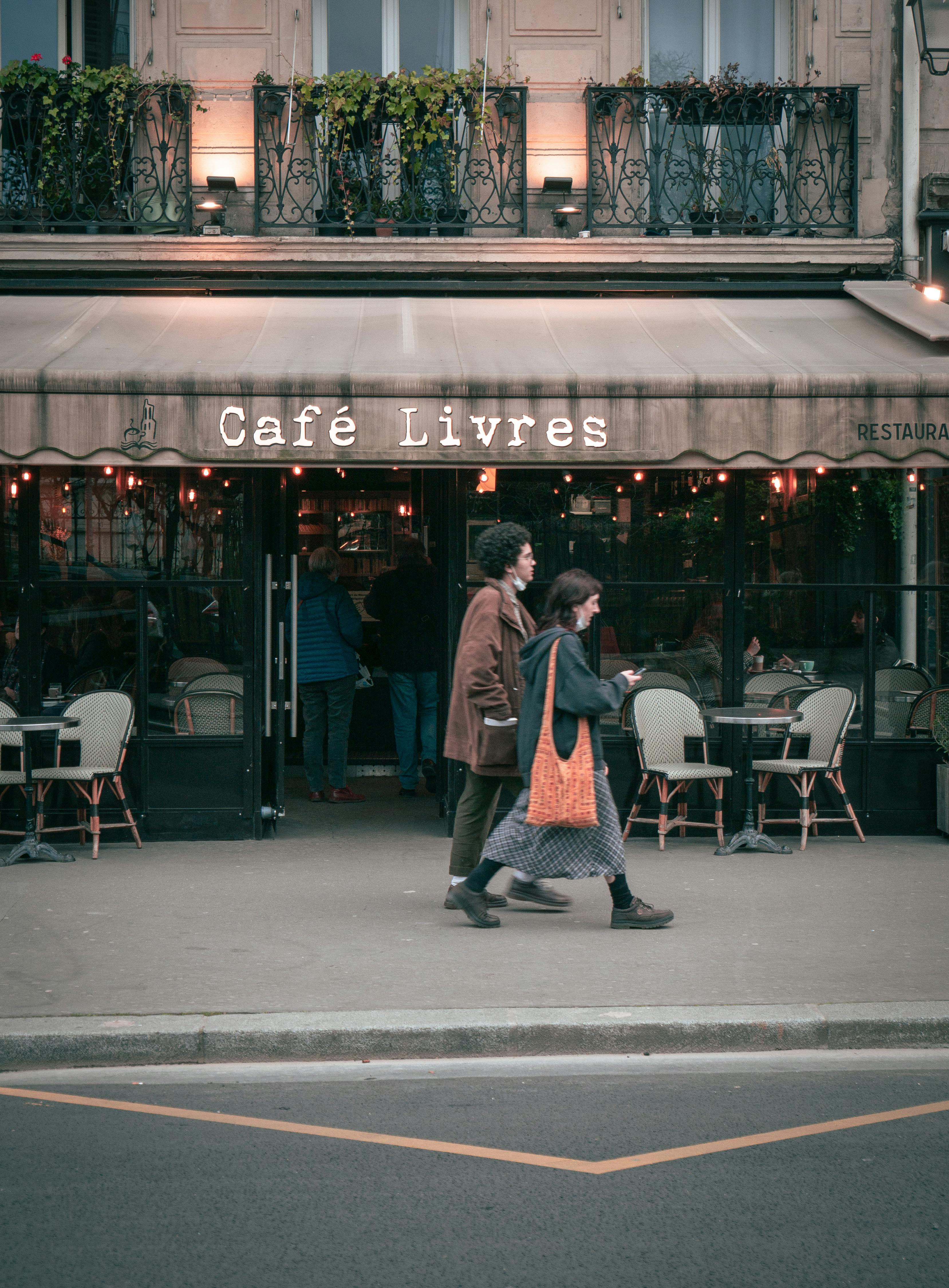People Walking near Restaurant · Free Stock Photo