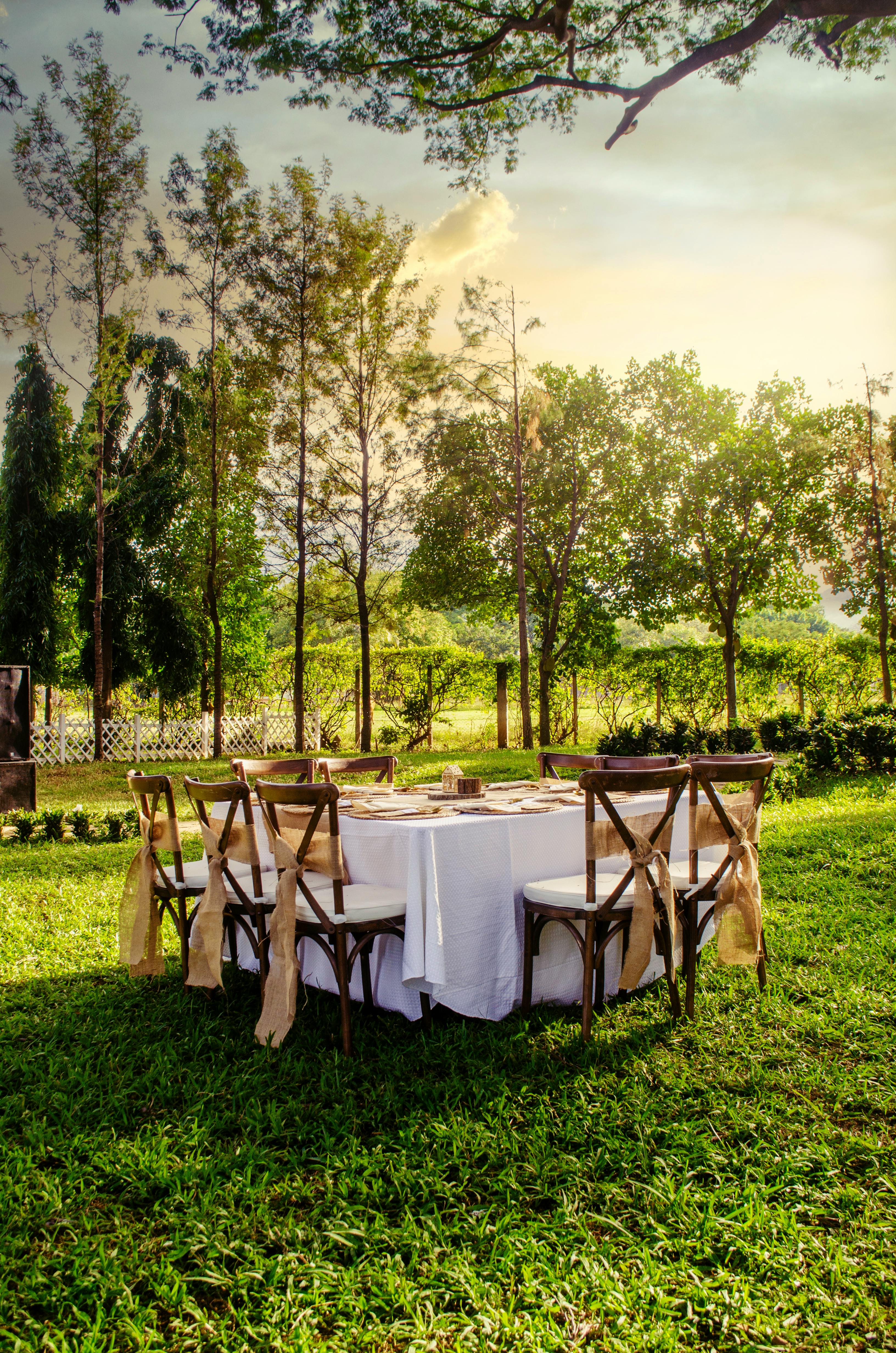 Dining Table on Green Grass · Free Stock Photo