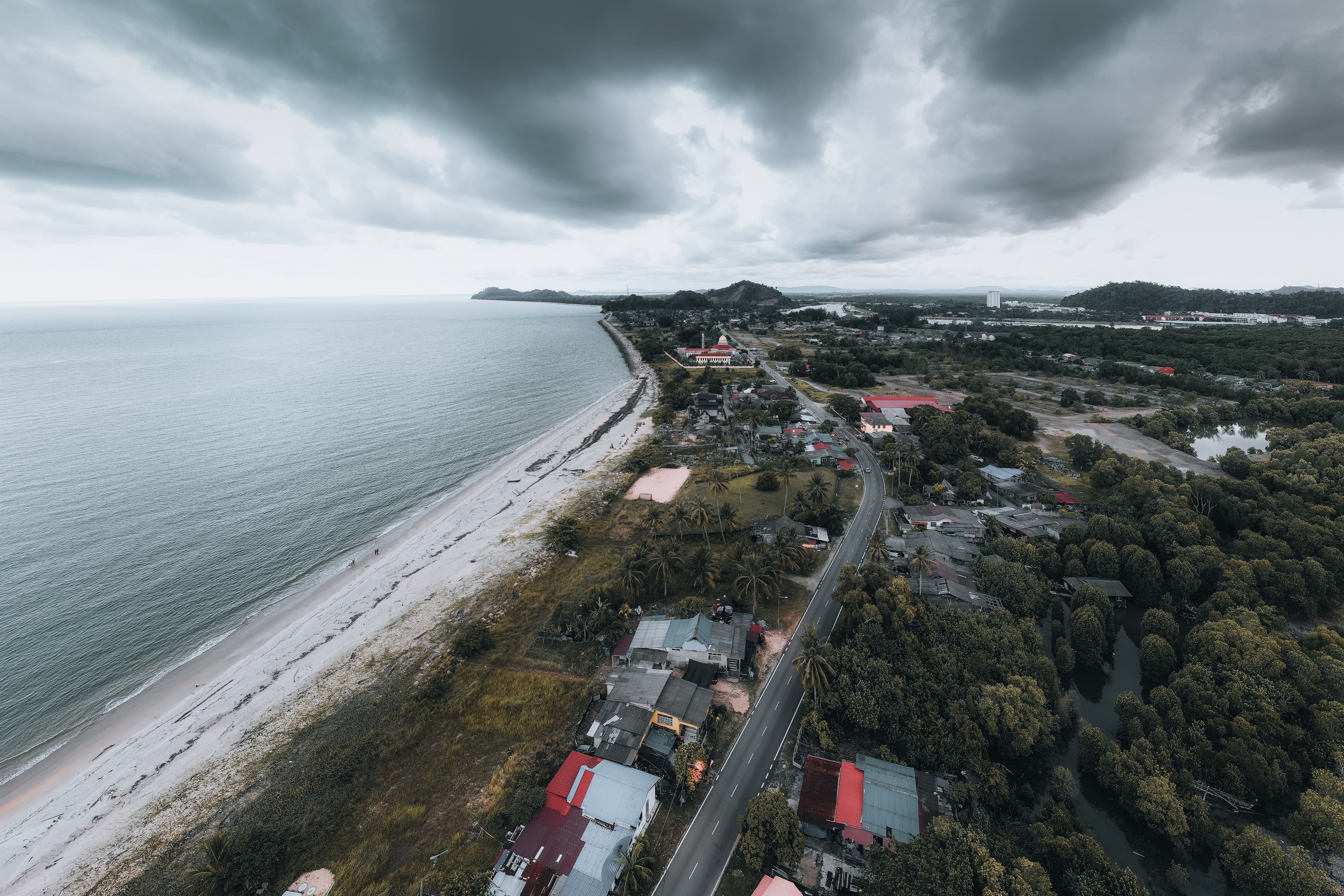 High Angle View of a Coastline and Horizon with Overcast · Free Stock Photo