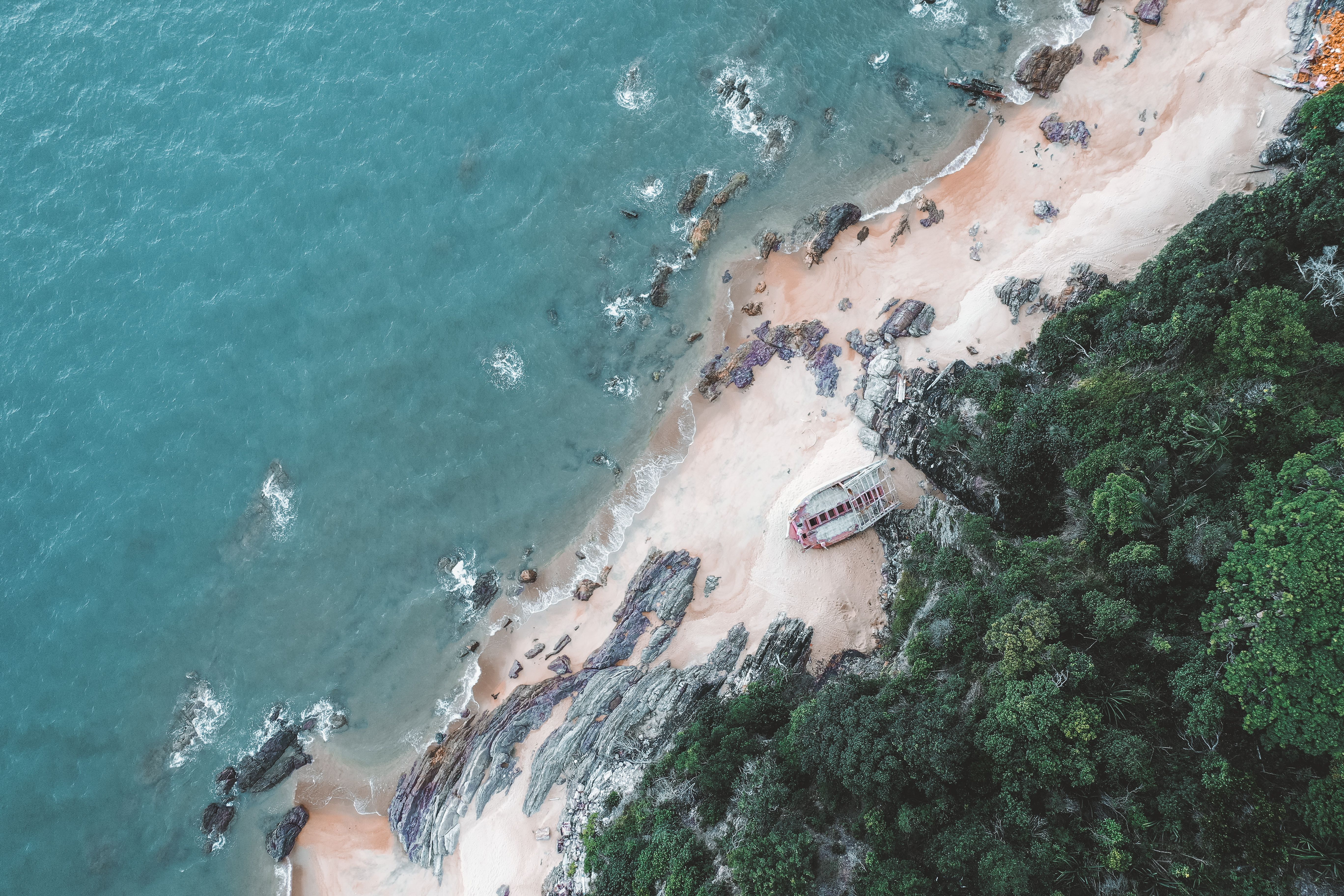 Aerial Footage of a Shipwreck on a Beach · Free Stock Photo