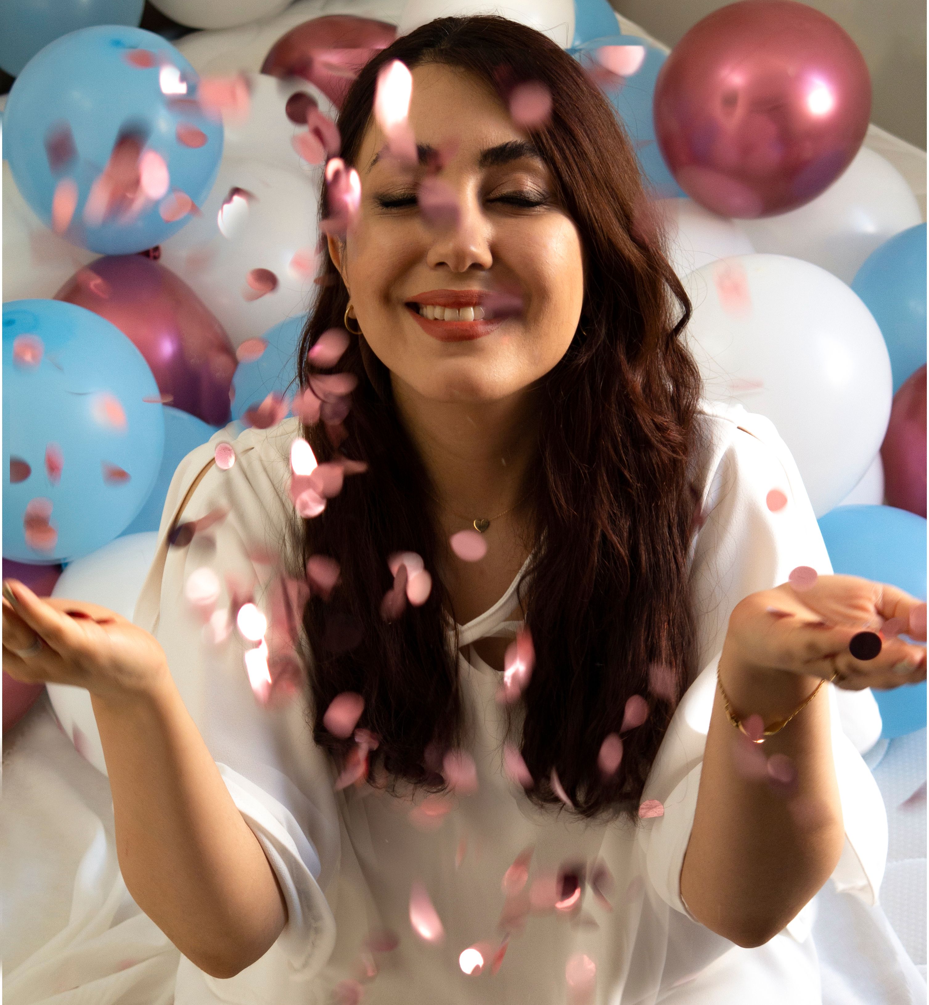 Woman Throwing Confetti · Free Stock Photo