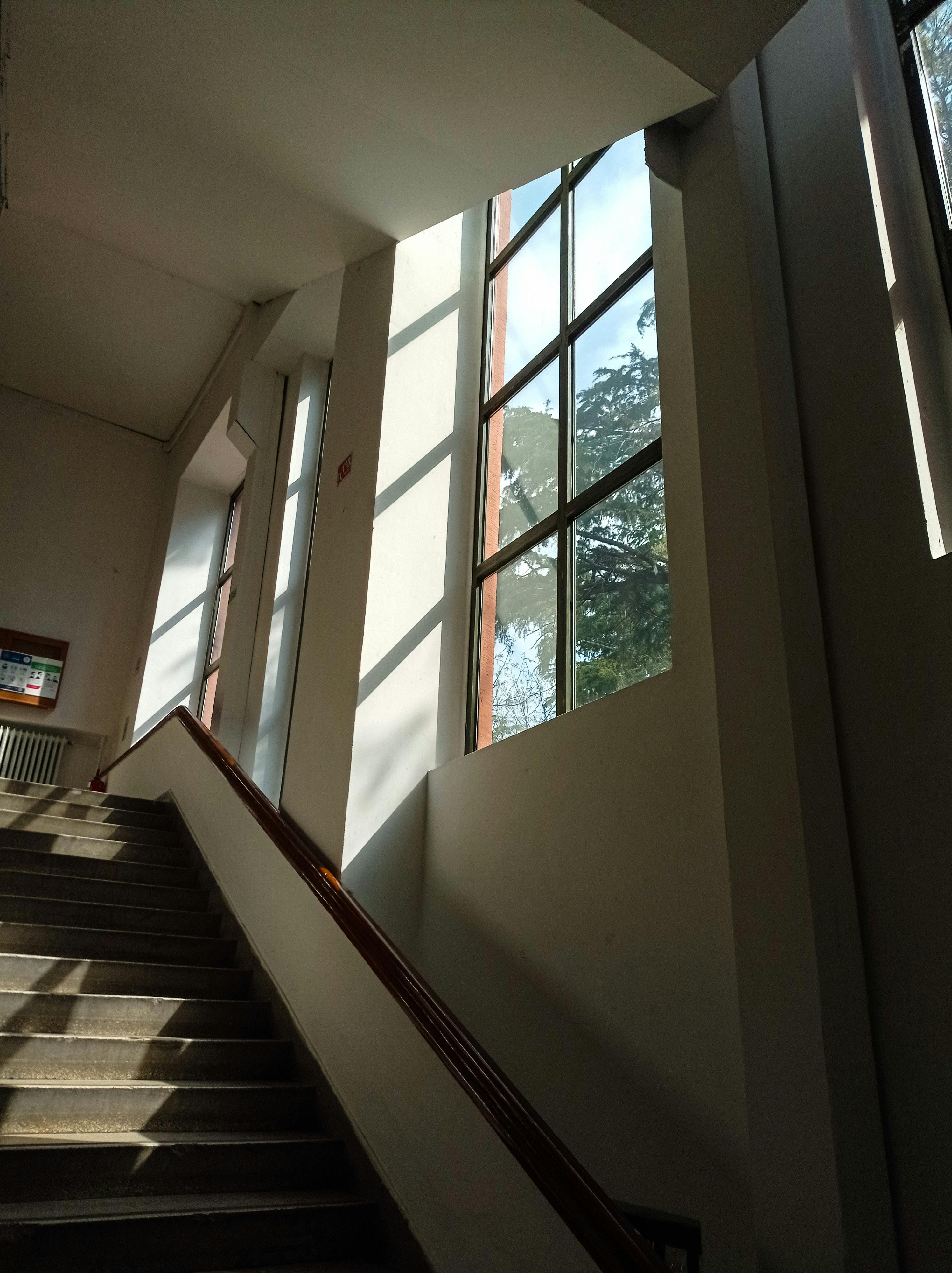 Staircase Near Glass Window · Free Stock Photo