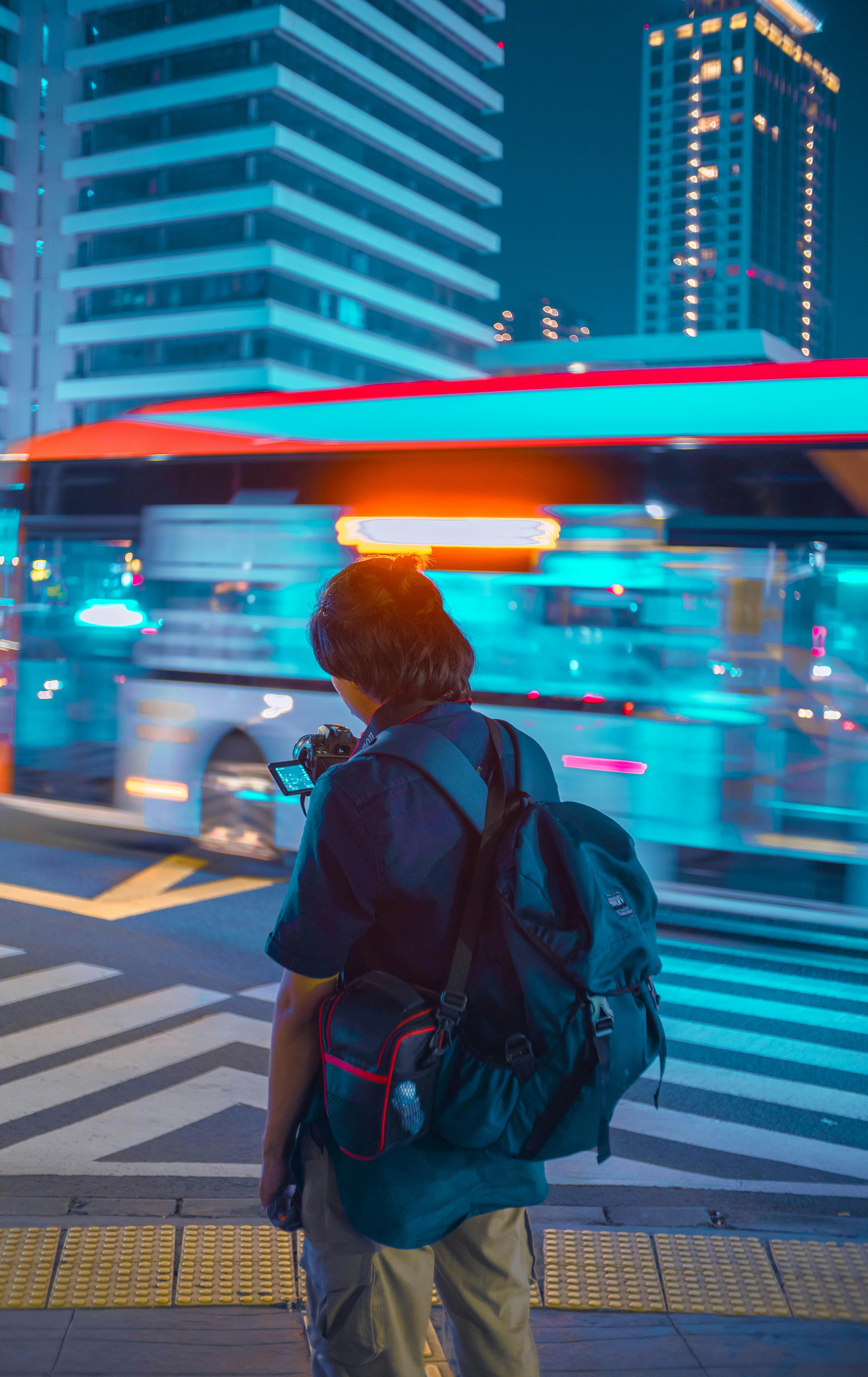 Man Standing near Street at Night · Free Stock Photo