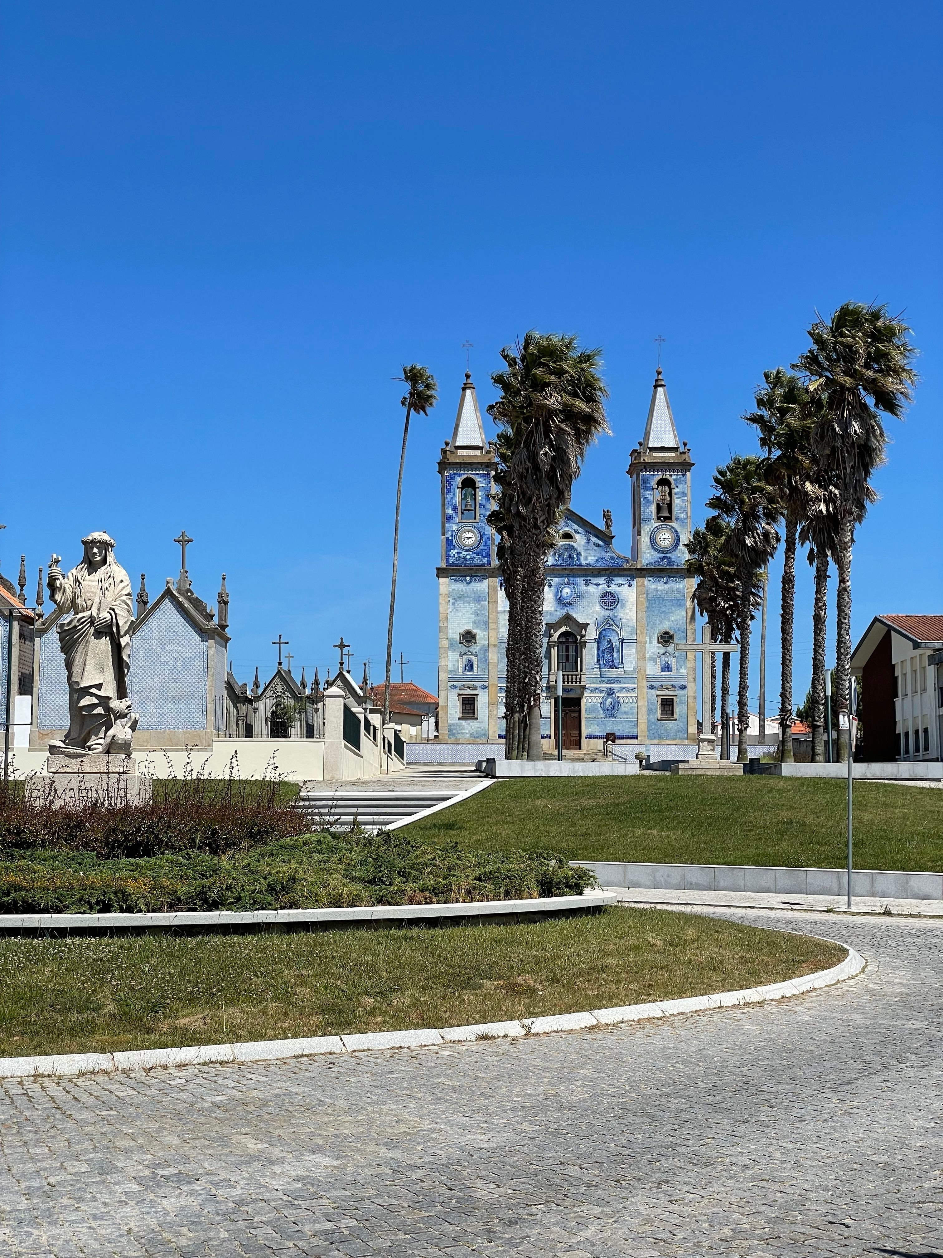 Blue Church on a Cemetery, and Blue Sky · Free Stock Photo