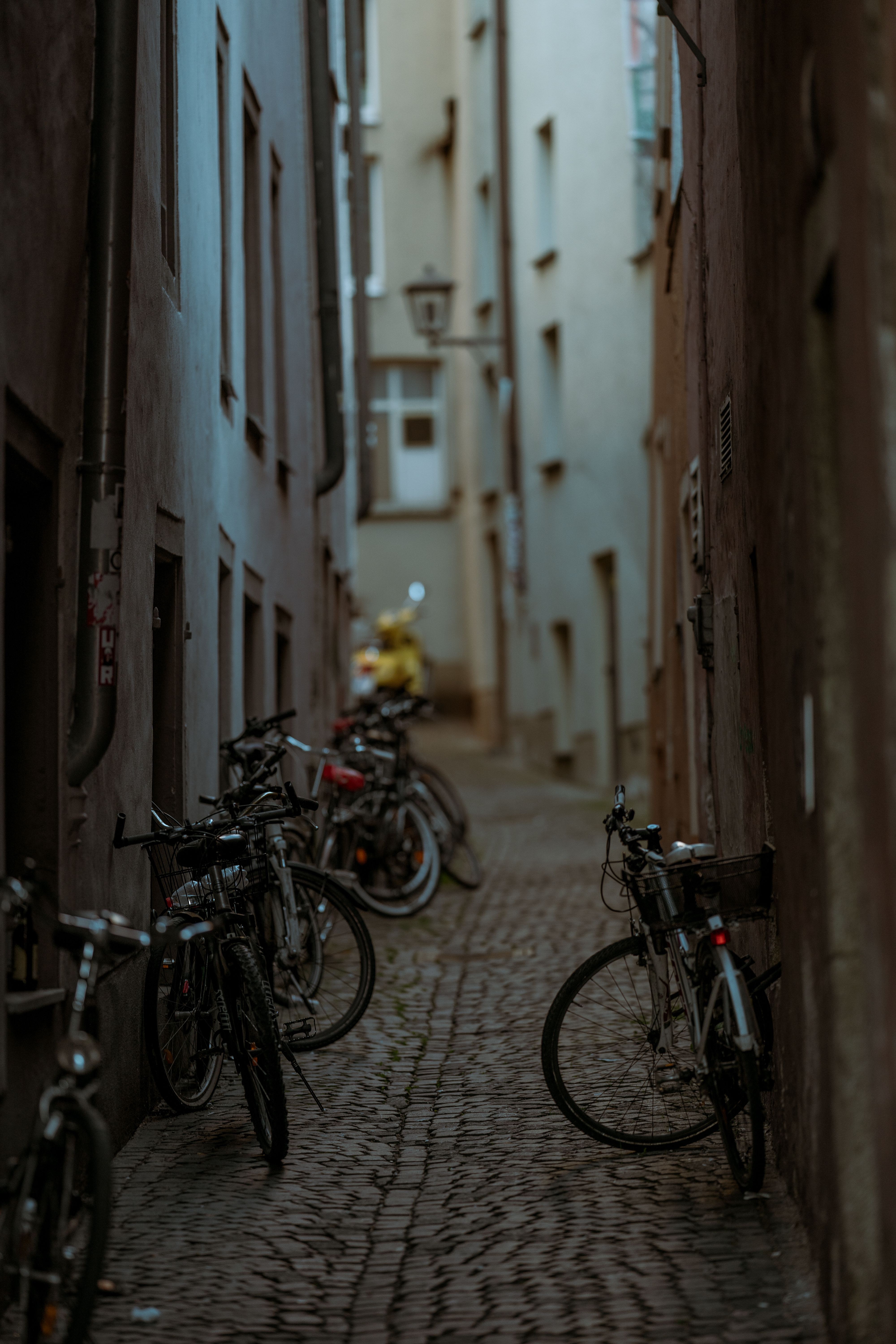 Alleyway Between Building Made of Bricks · Free Stock Photo