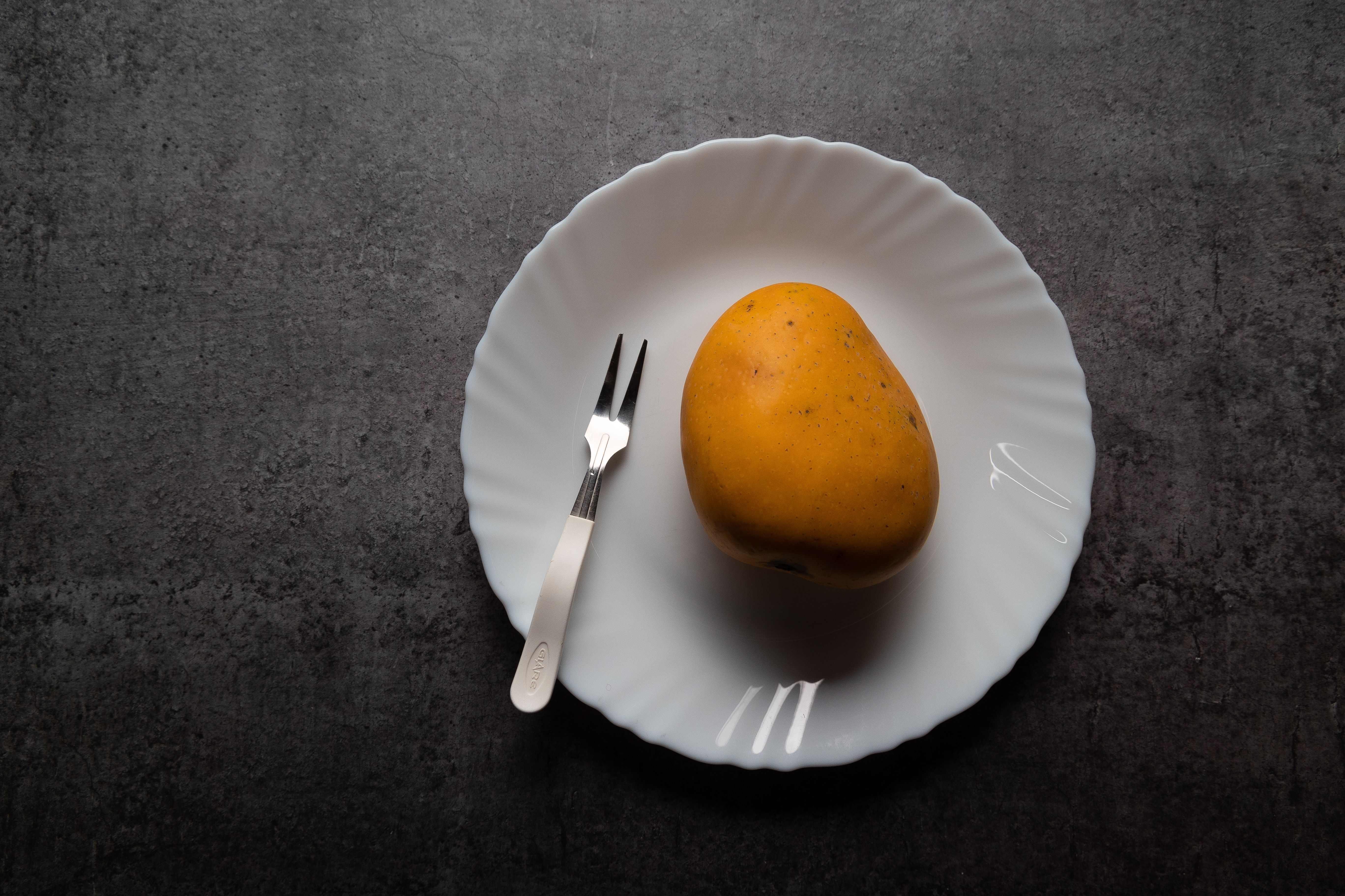 Mango on a White Plate · Free Stock Photo