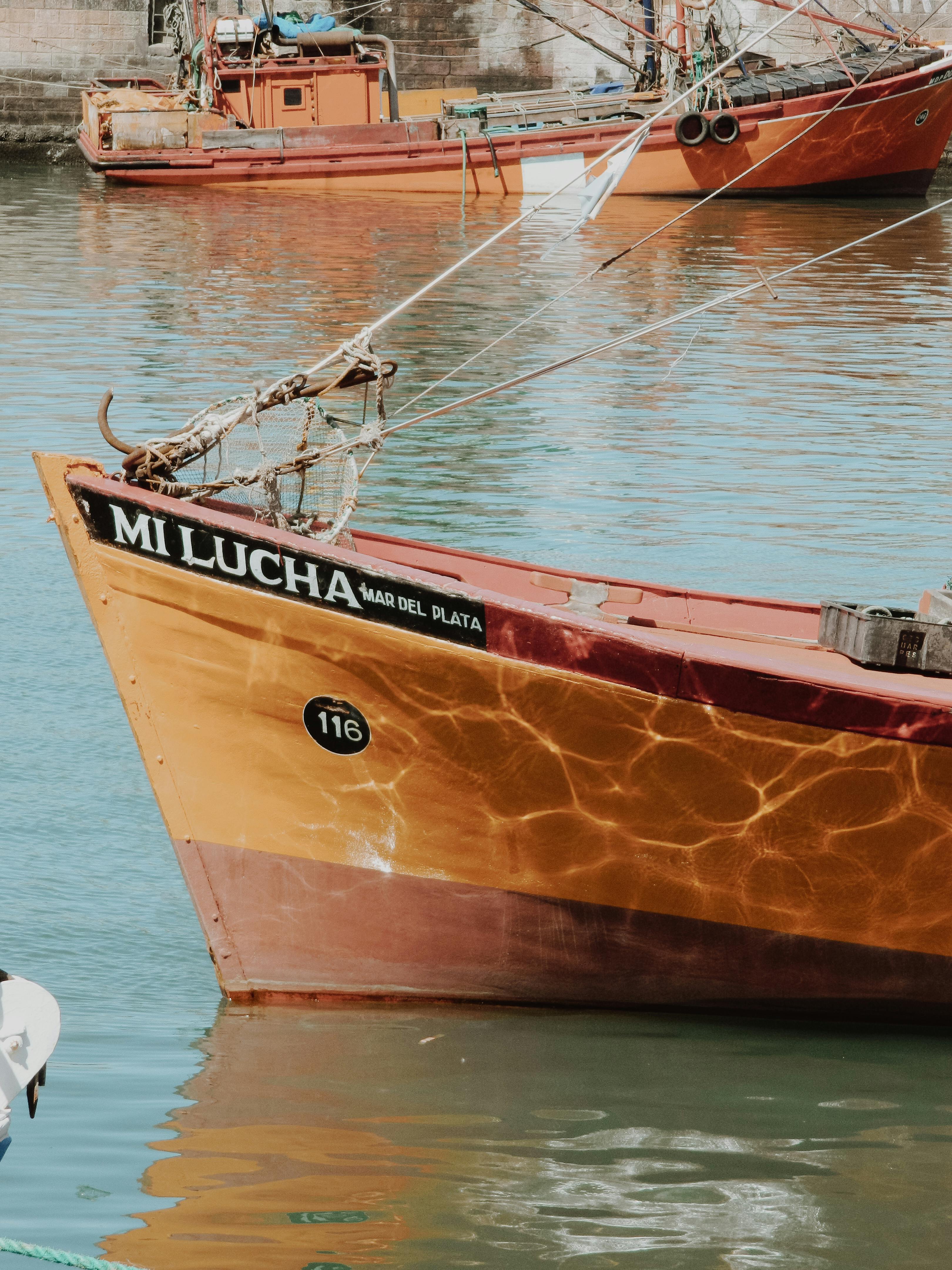 Brown Boat on Water · Free Stock Photo