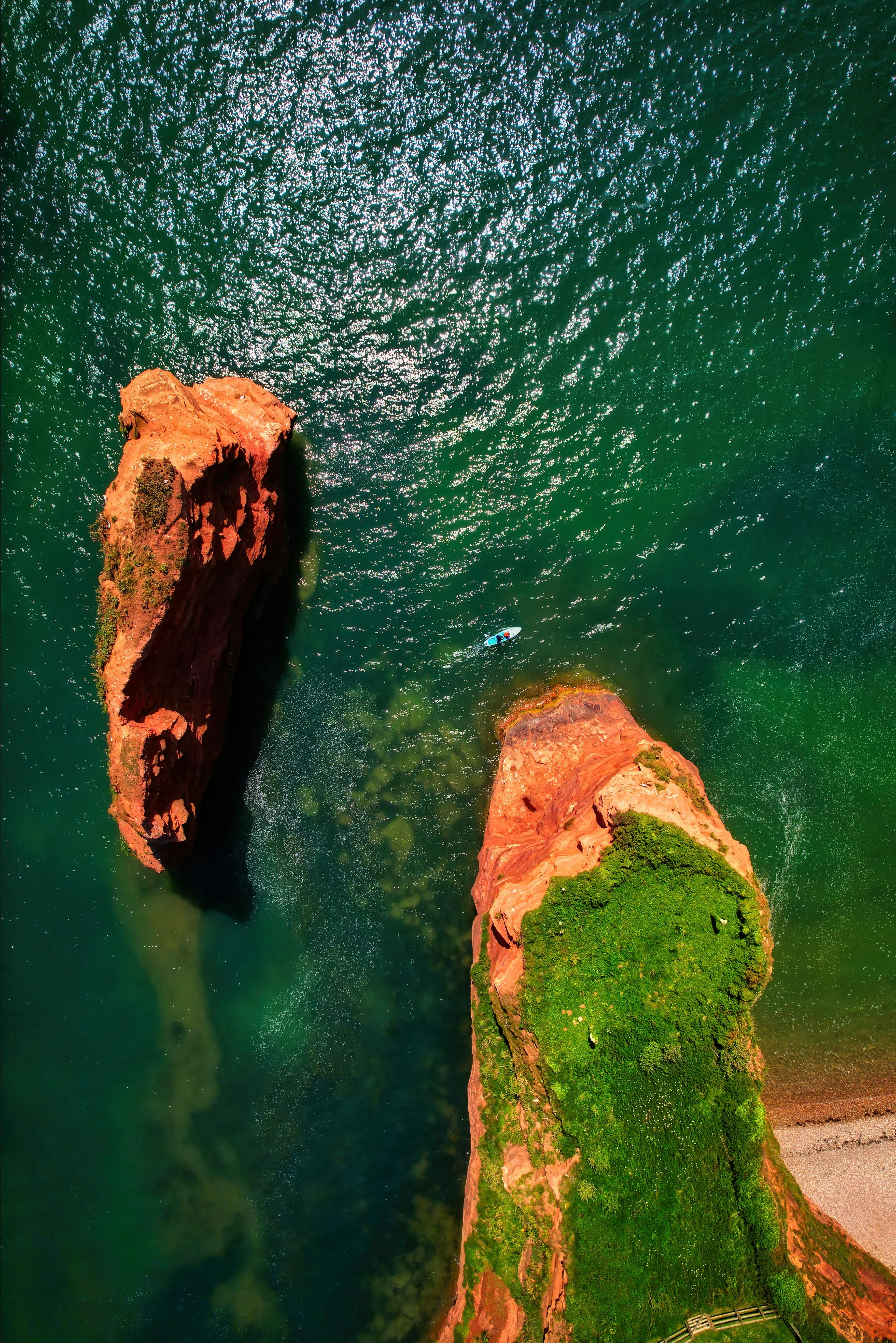 Aerial View of a Cliff Beside the Ocean · Free Stock Photo
